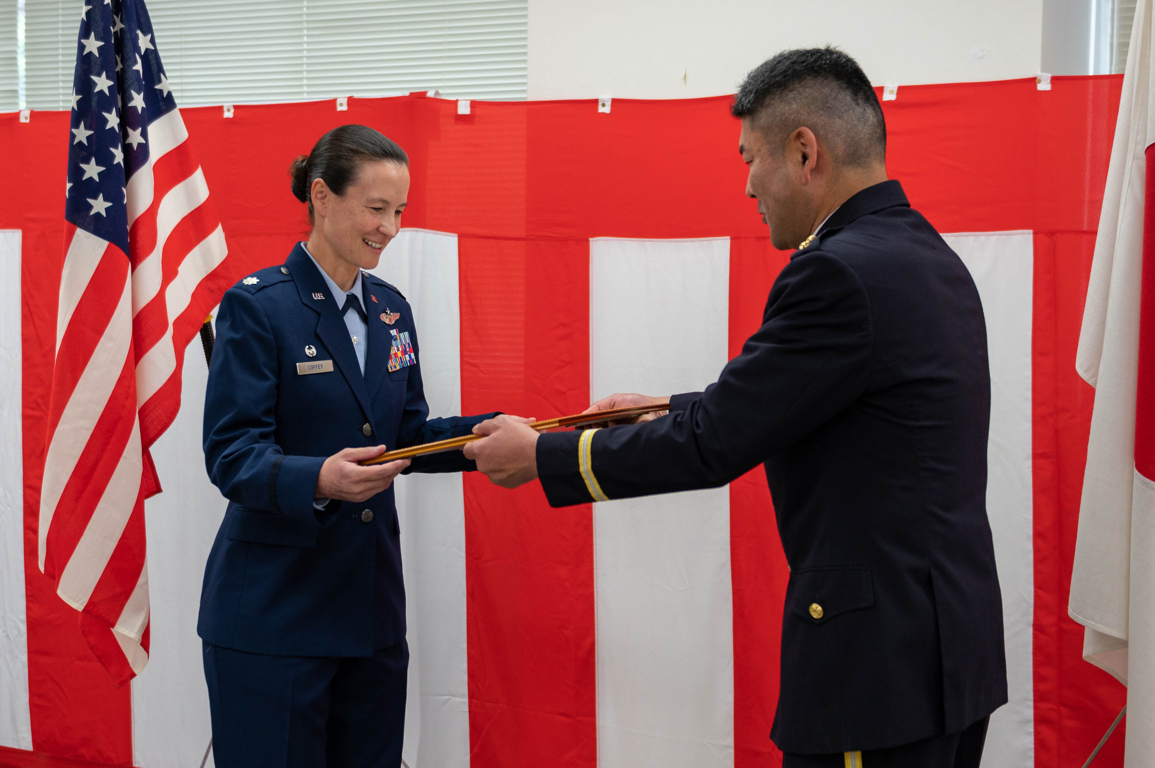 Yokota, JGSDF leaders exchange Co-Op awards > Secretary of the Air ...