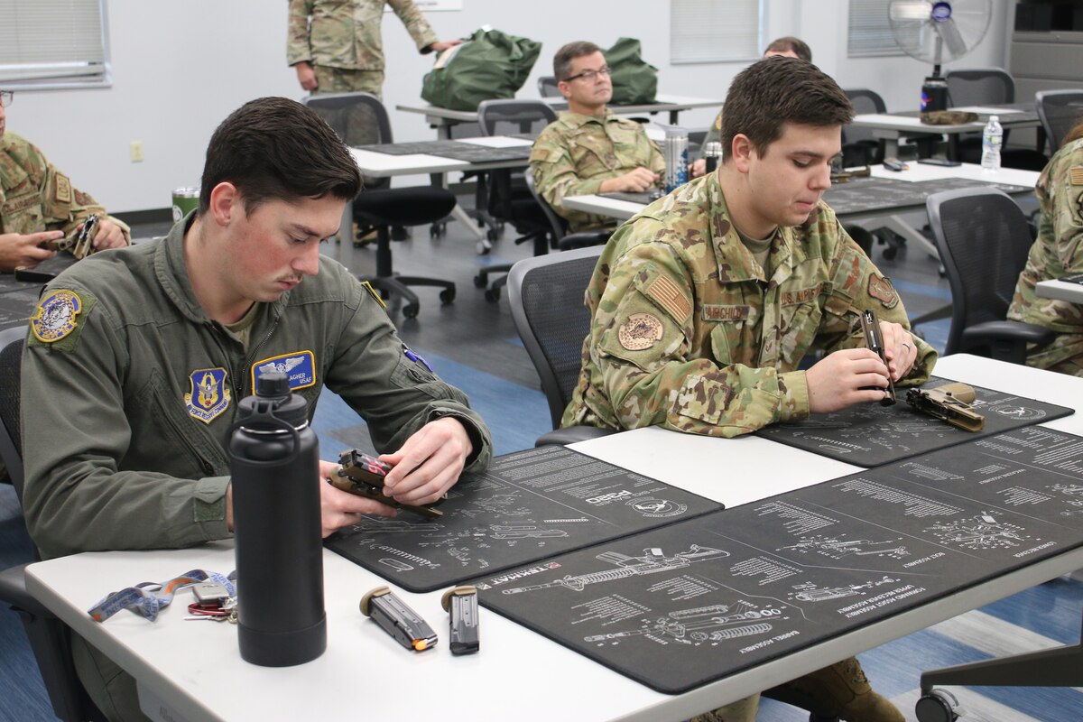 445th AW, 655th ISRW train on new strike-fire pistol > 505th Command and Control Wing > Article ...