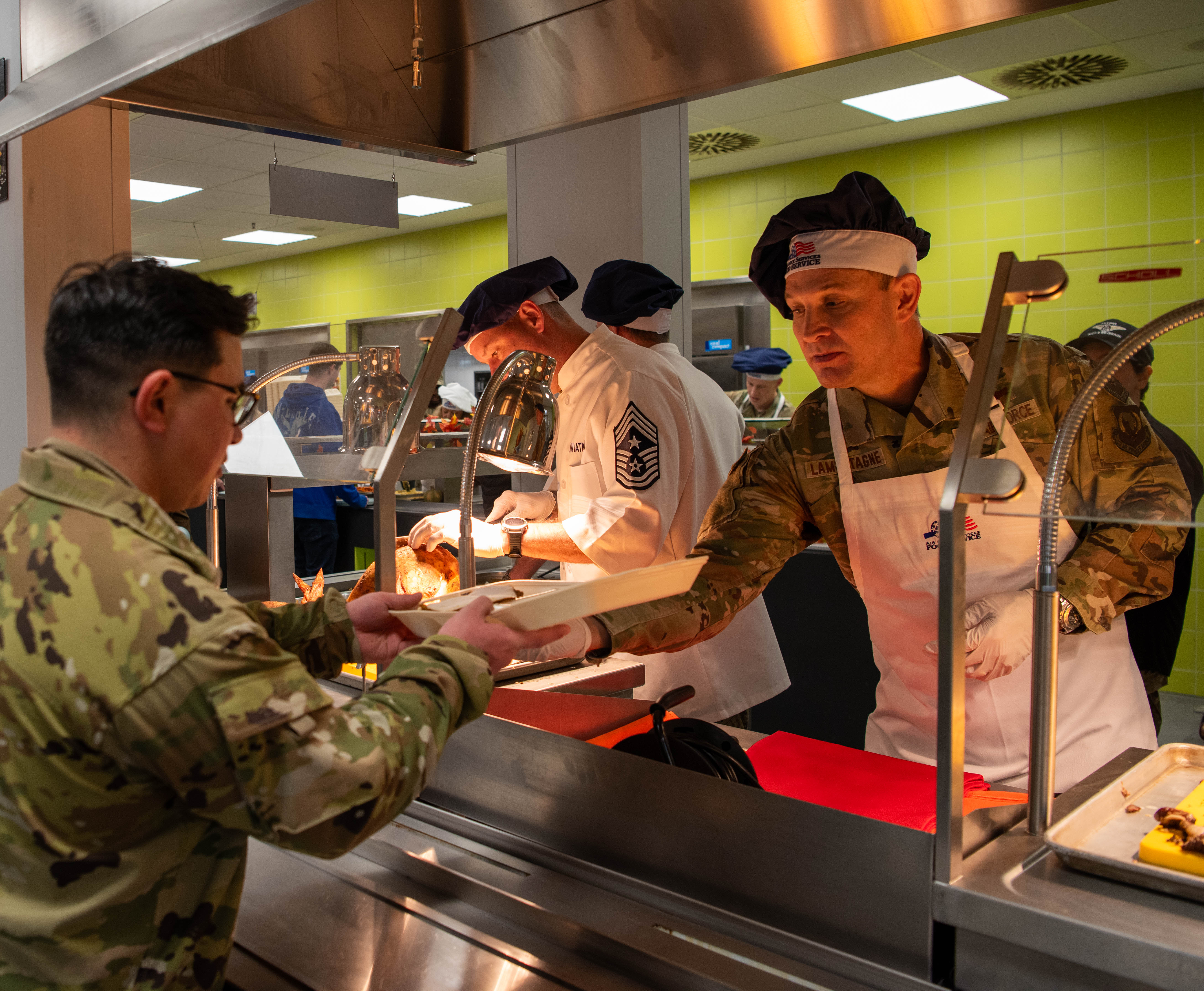 Ramstein AB leadership serves up smiles at the DFAC > Ramstein Air Base > Article Display
