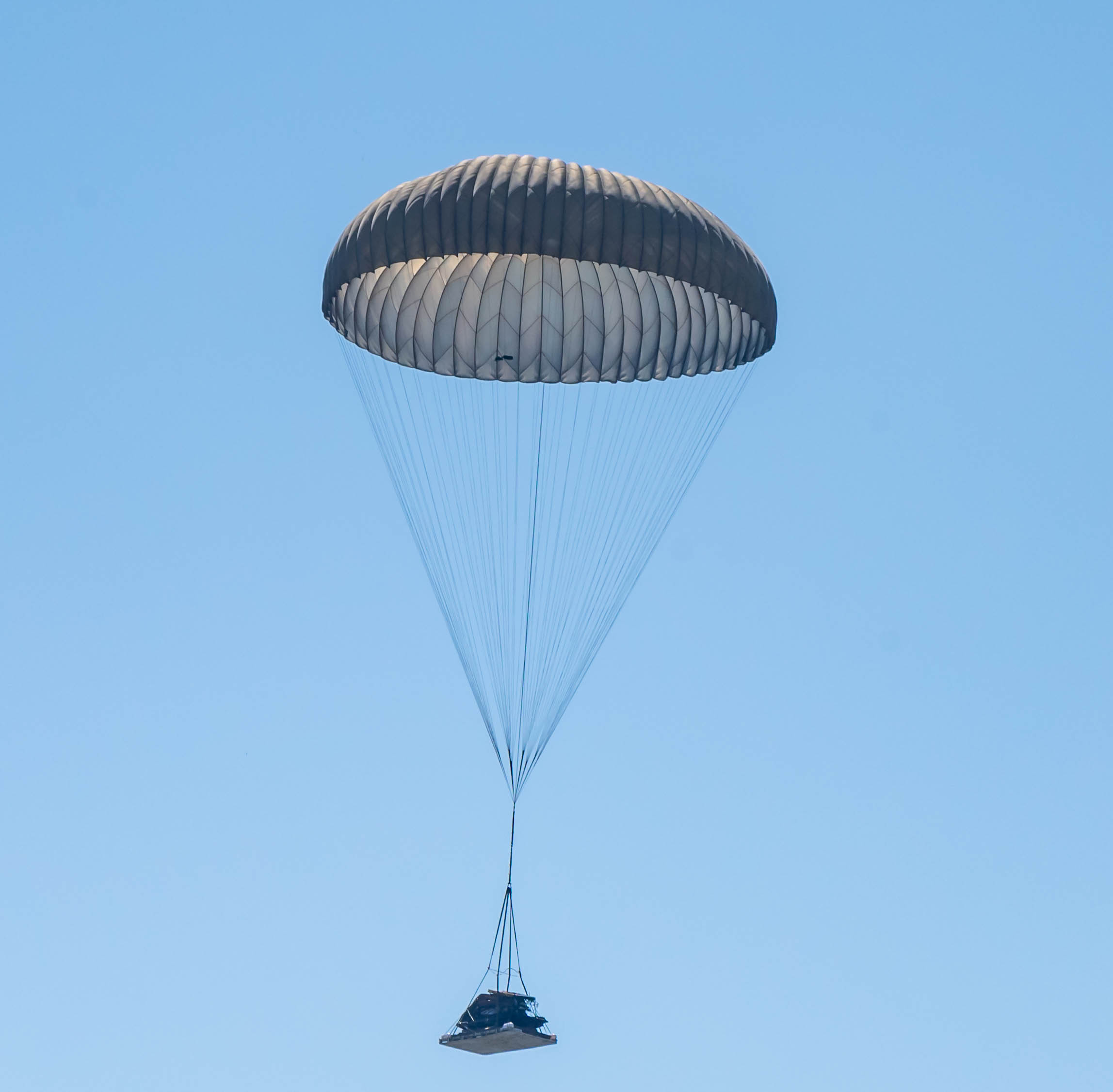 Parachute packers become airborne qualified to improve equipment ...