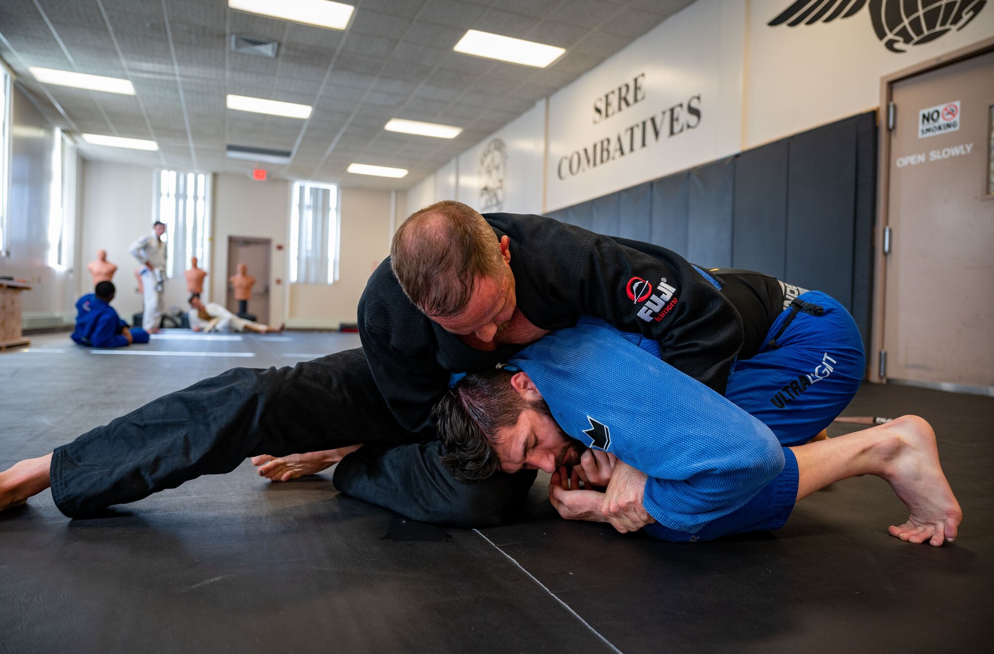 Conducting open mat combatives training > Dover Air Force Base > News