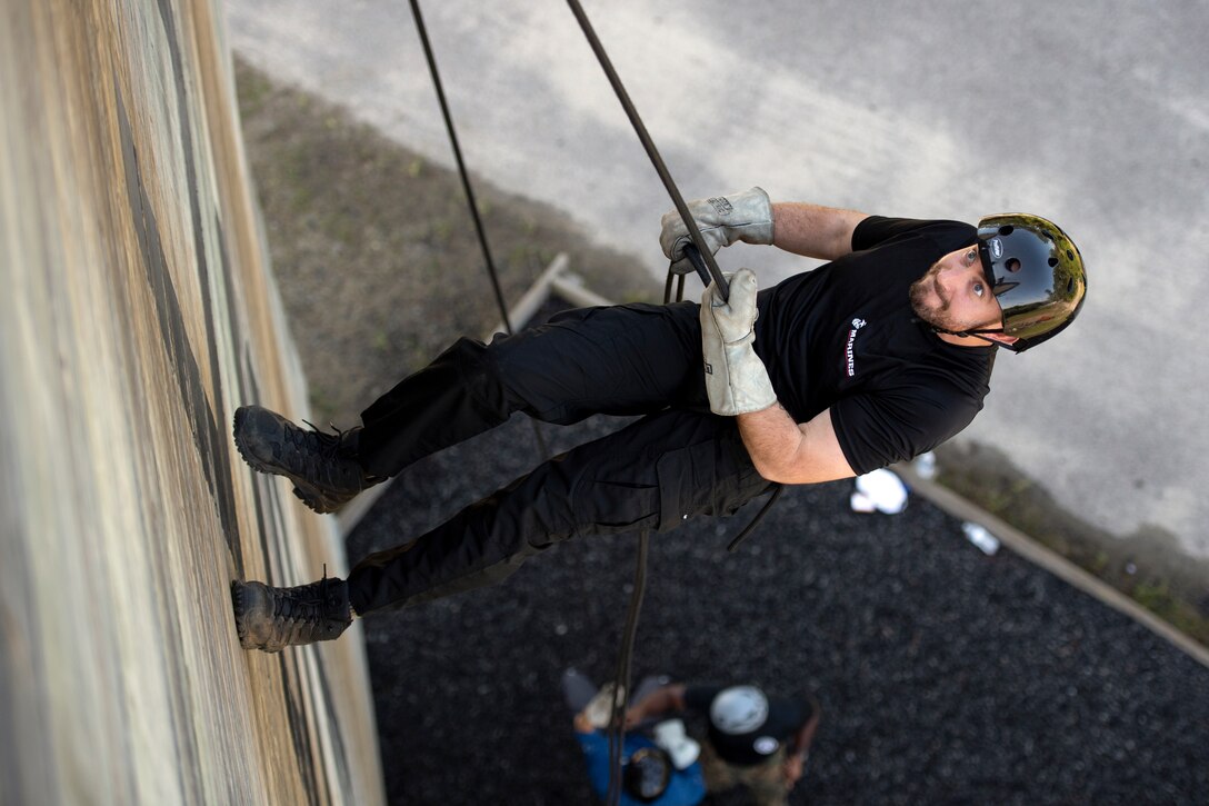 JCOC Participant tries the Rappel Tower