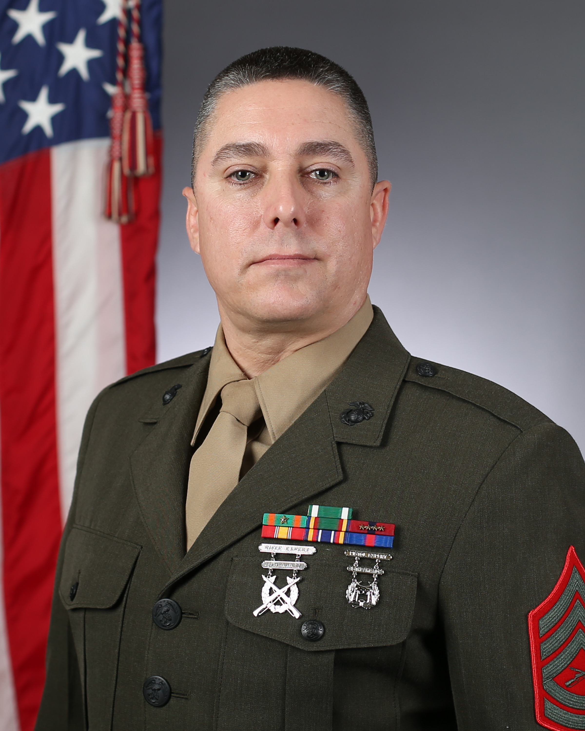 Gunnery Sergeant Eduardo Espinosa > Marine Music > Official Biography