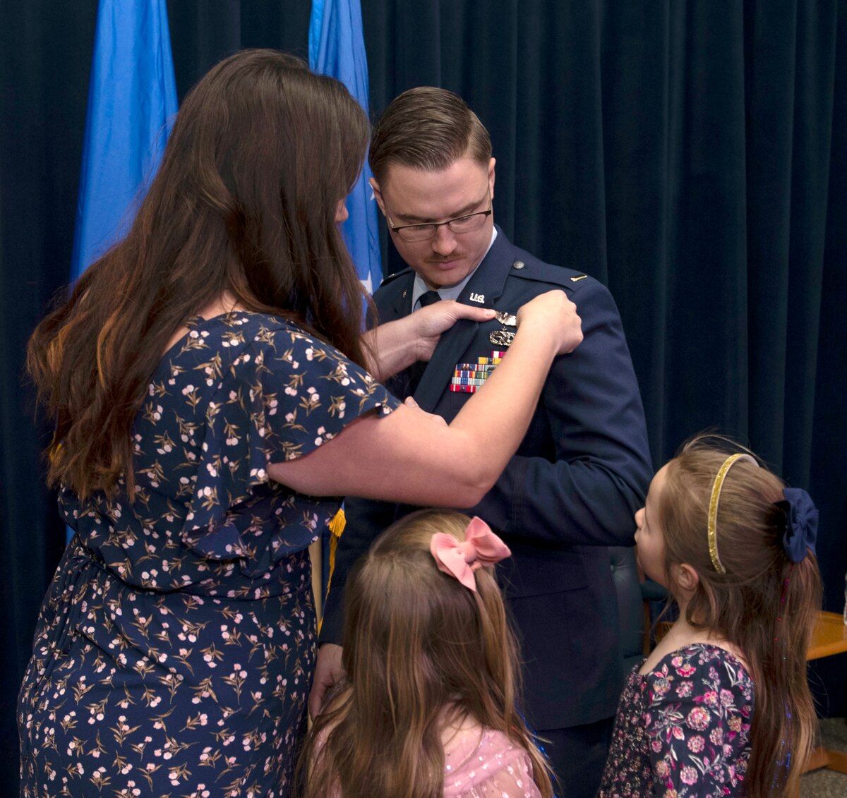 Class 25-03 students pin on wings following their graduation ceremony ...