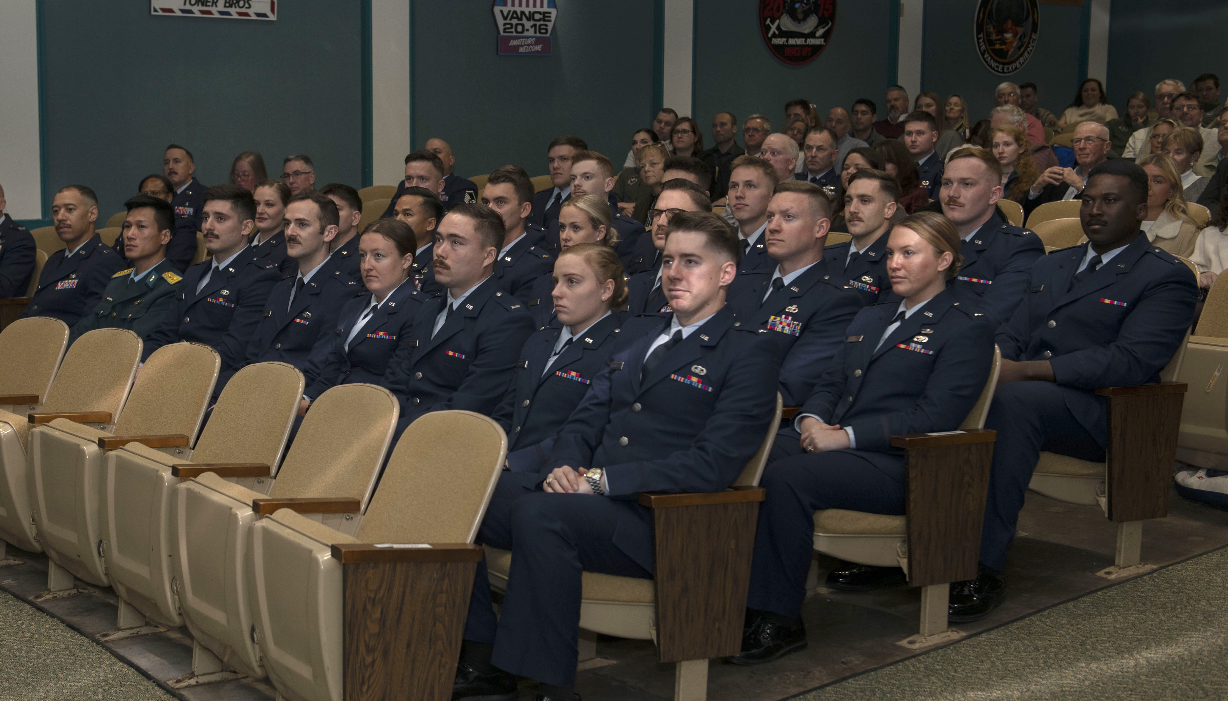Class 25-03 students pin on wings following their graduation ceremony ...