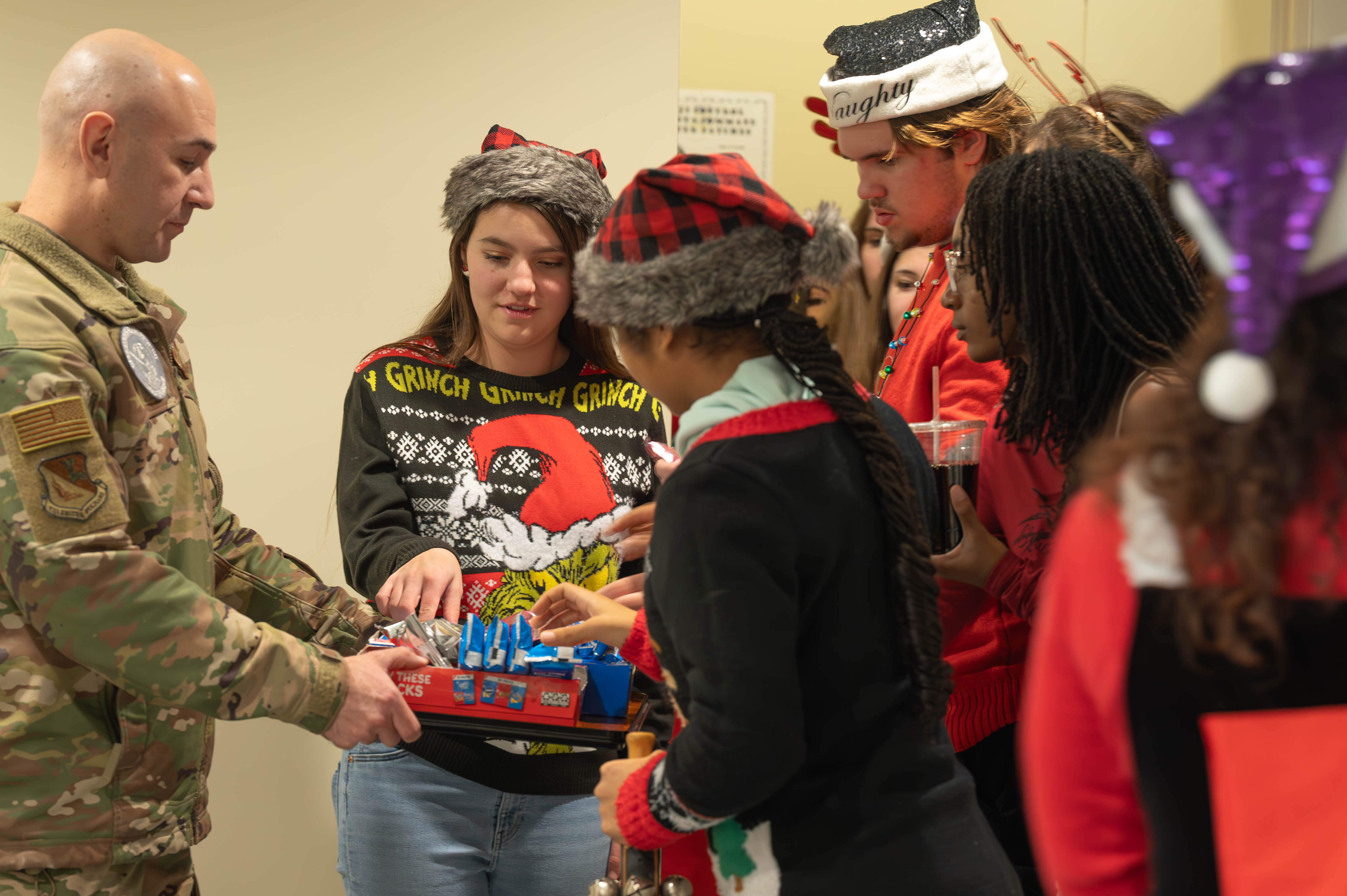 Hitting the right notes: Yokota students carol their way into the 374 ...