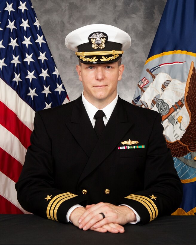 Commander Michael Hughes