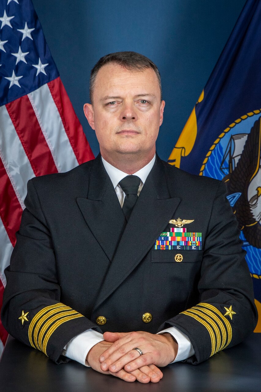 CAPT. Ethan D. Haines, Chief of Staff > Commander, Carrier Strike Group ...