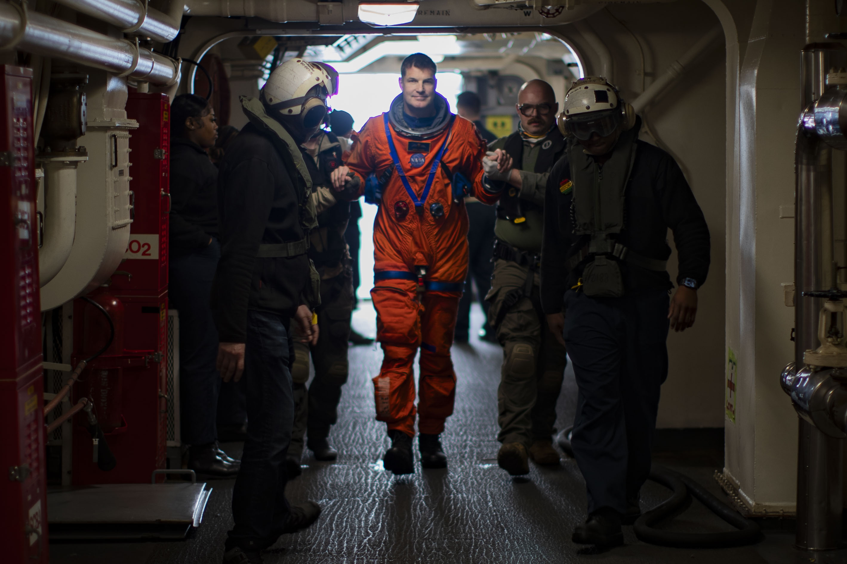 USS San Diego Sailors run medical drill with NASA astronauts while ...