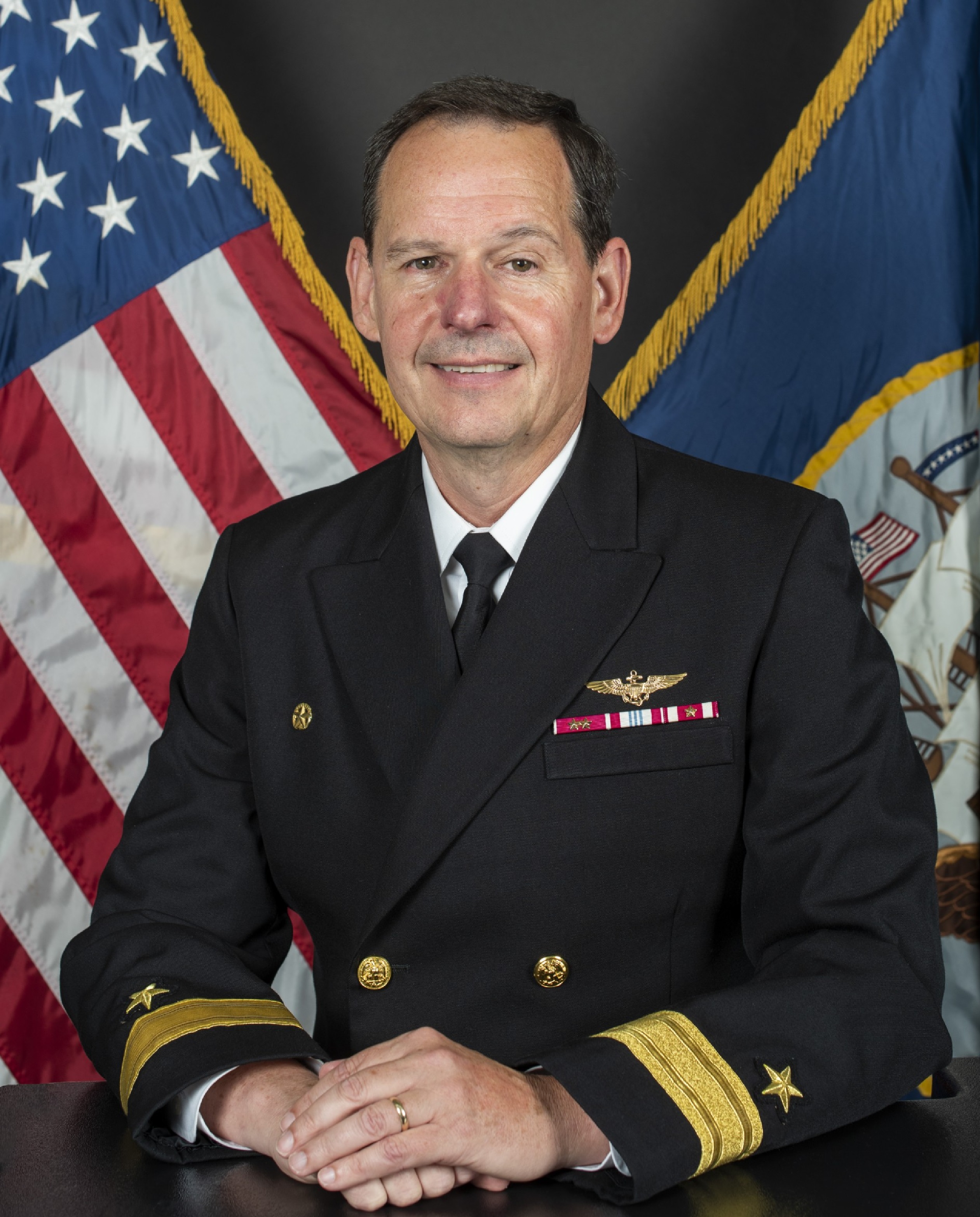 RDML Maximilian Clark > Naval Surface Force, U.S. Pacific Fleet > Biography