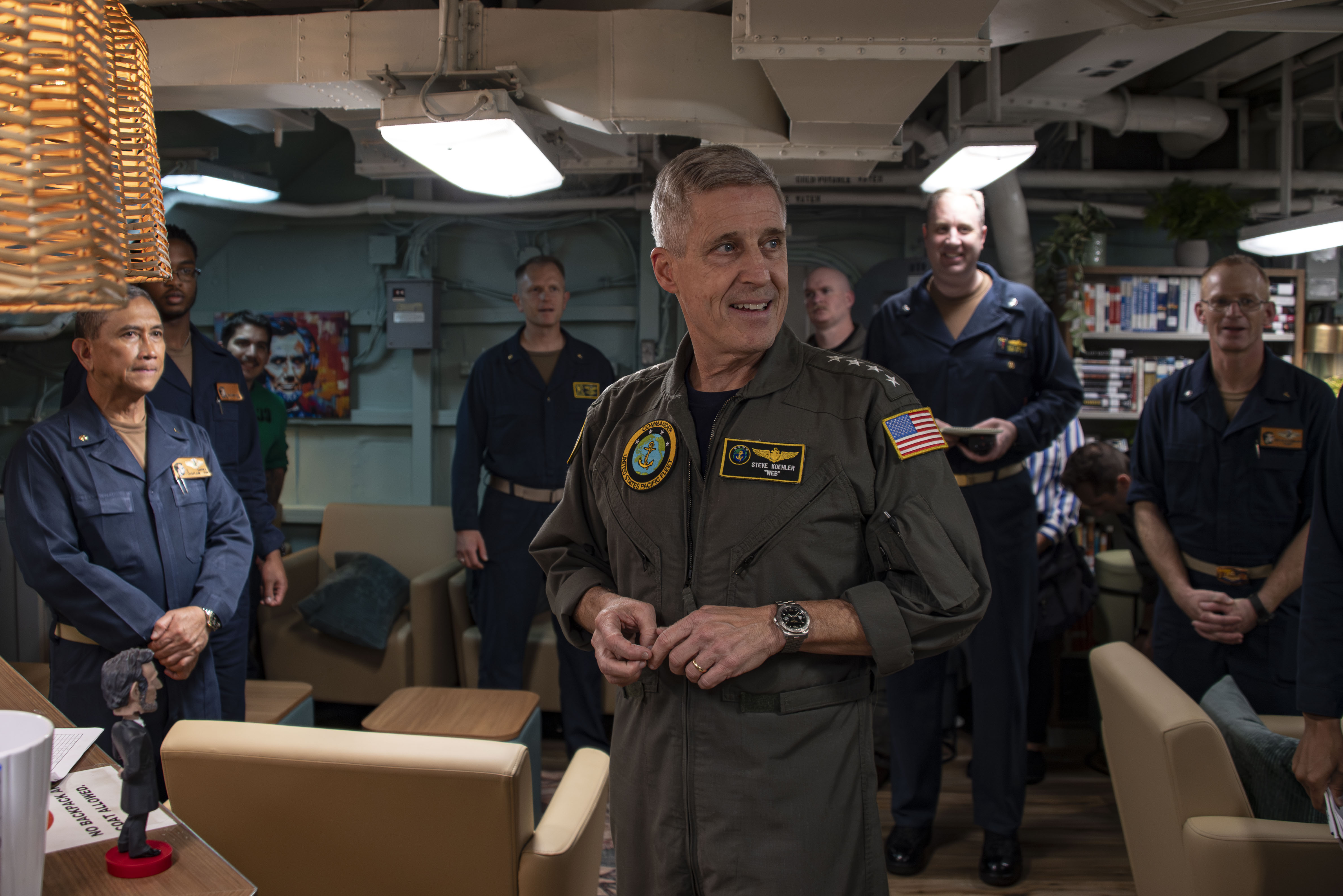 Adm. Steve Koehler tours the USO aboard Abraham Lincoln