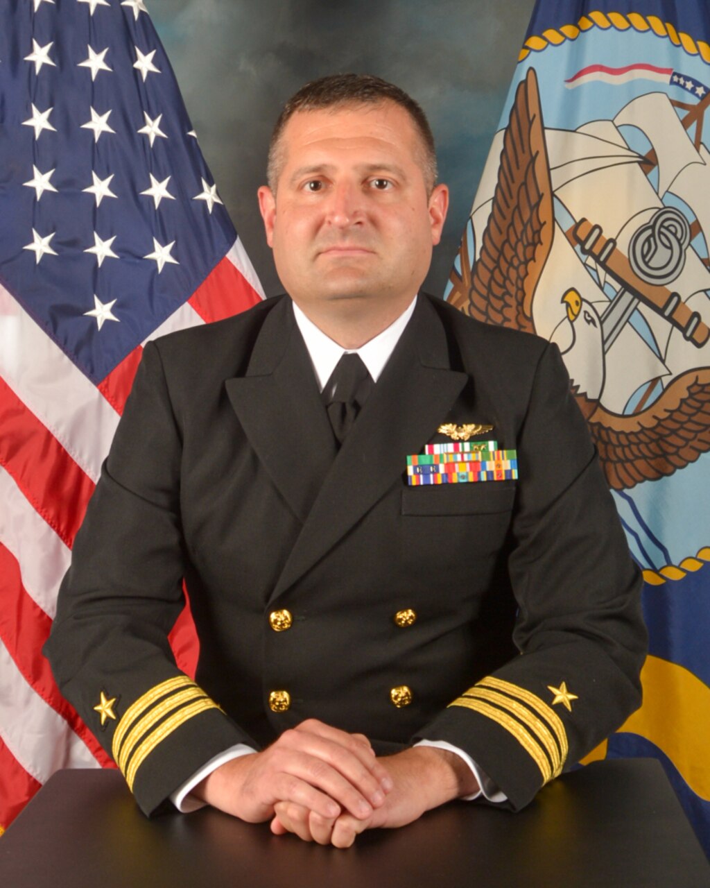 Commander Andrew D. Babakan > Naval Education and Training Command ...