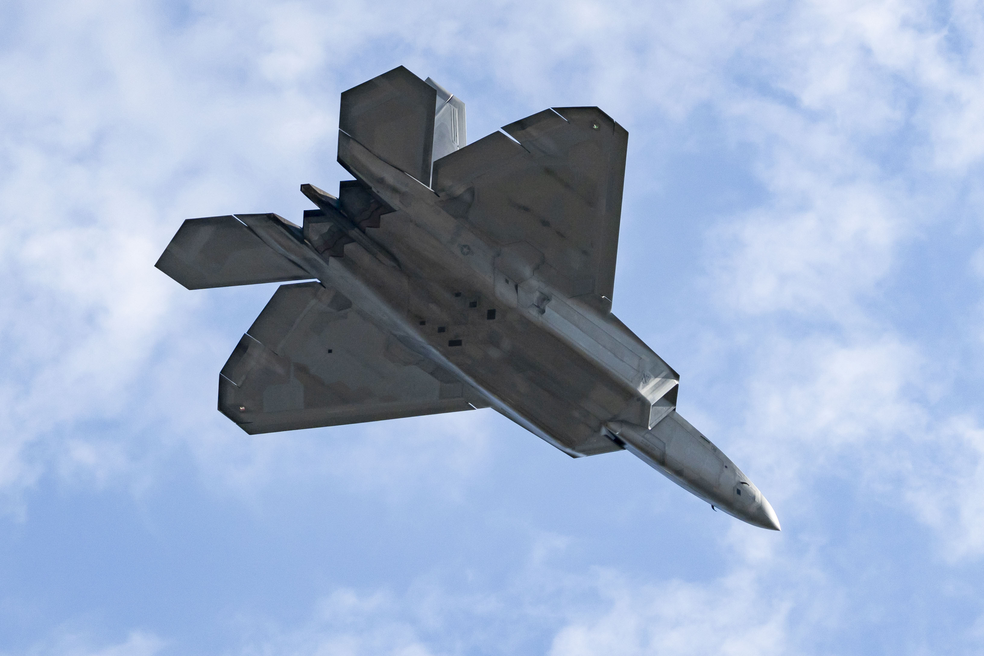 F-22 Raptors fly and train over JBER