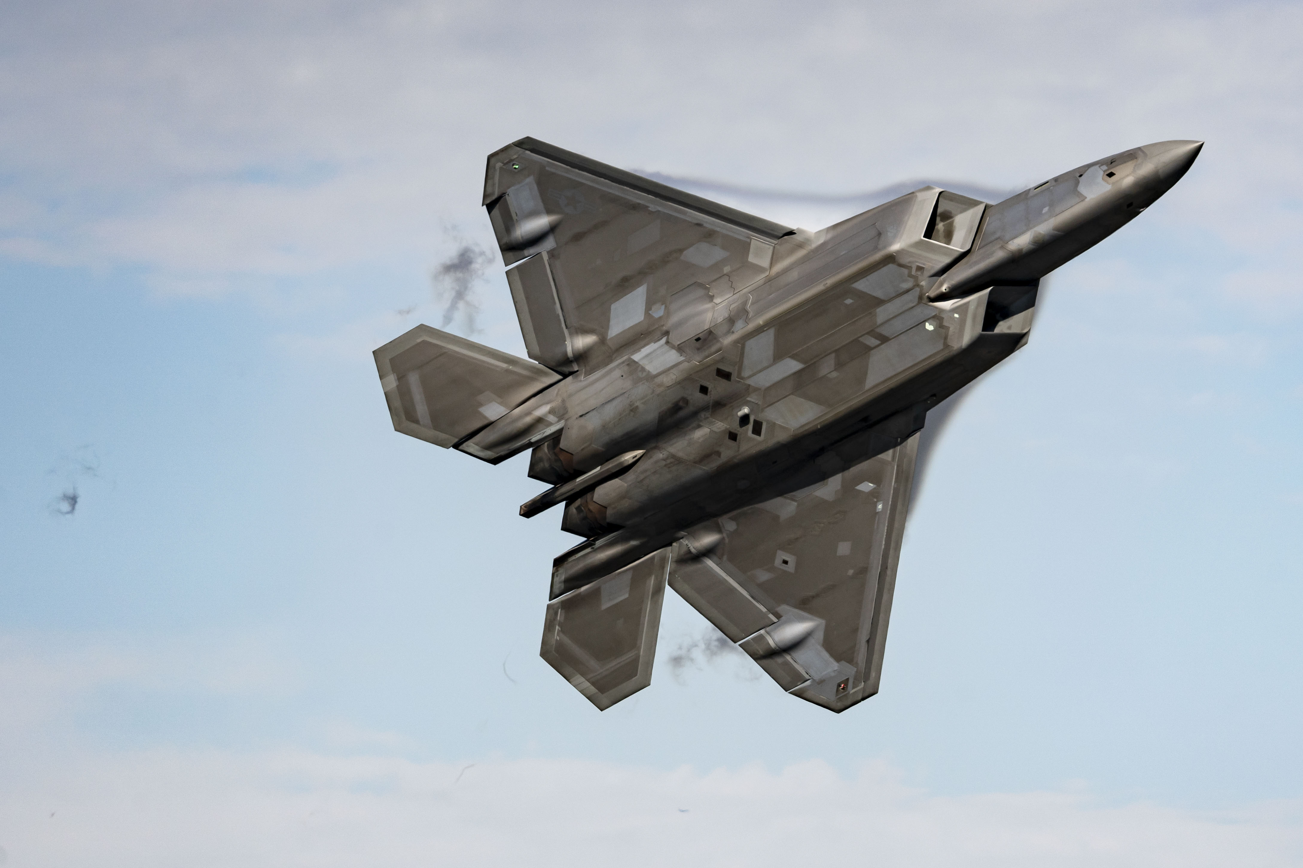 F-22 Raptors fly and train over JBER