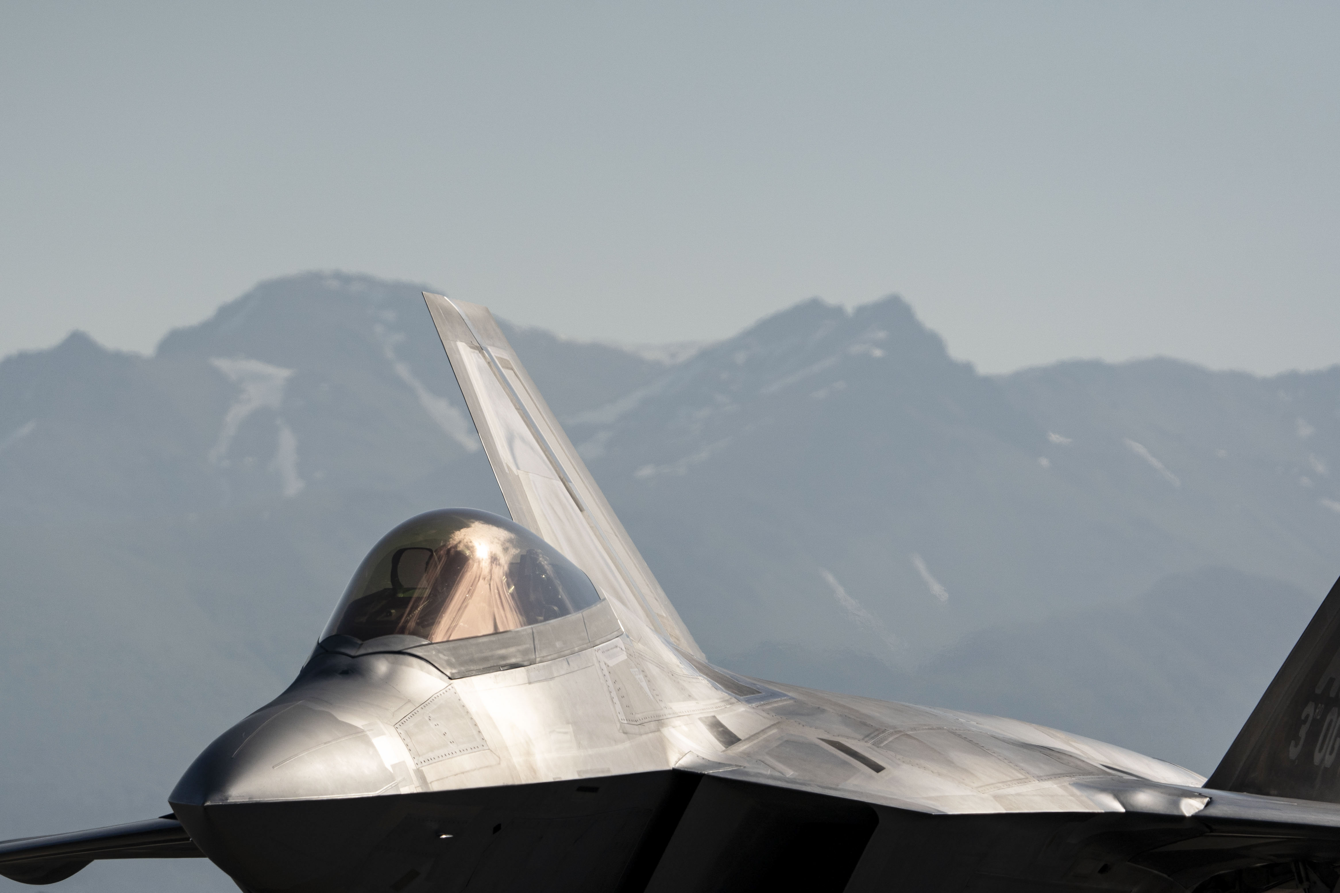 F-22 Raptors fly and train over JBER