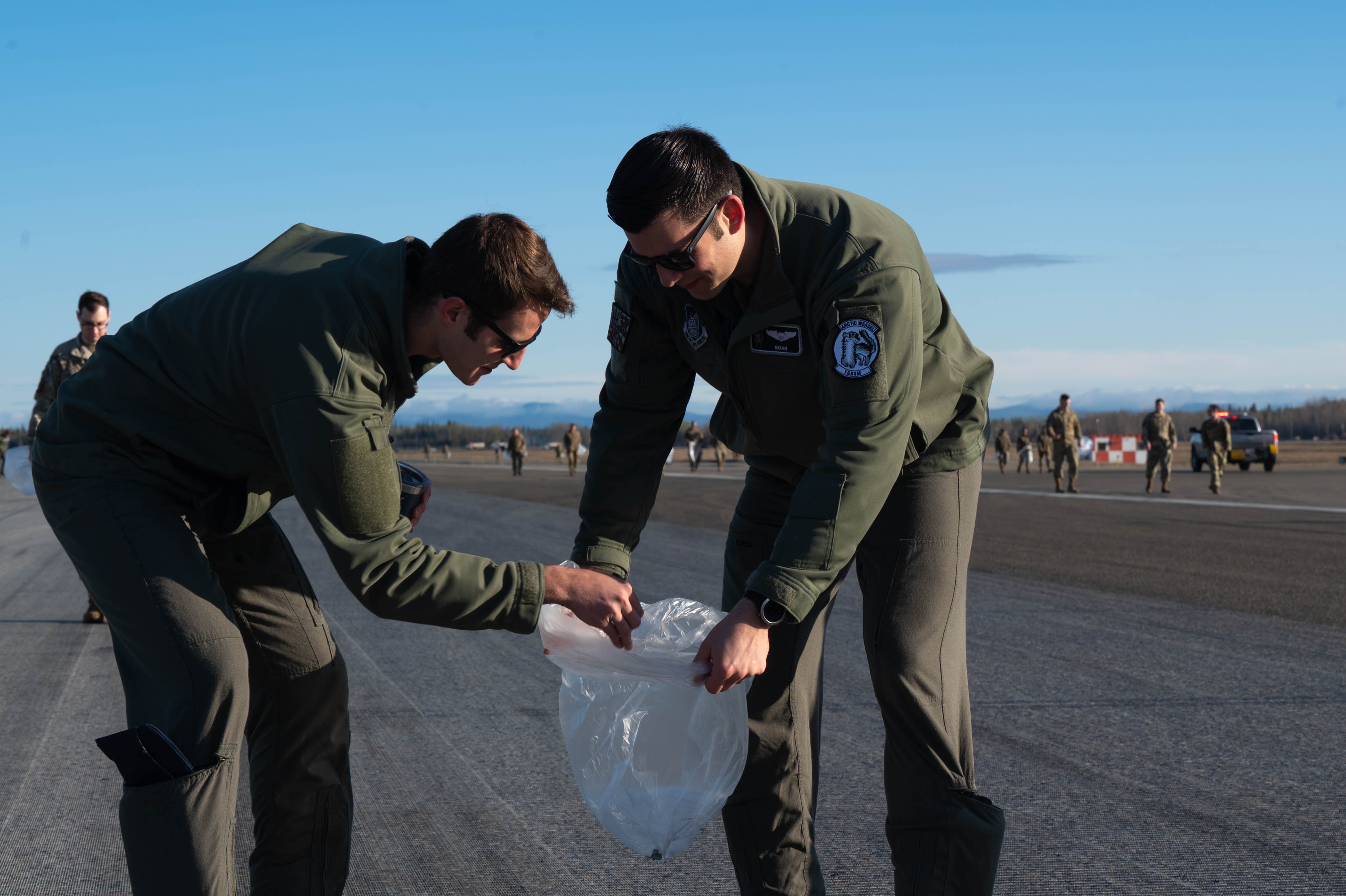 354th Airmen clean the flightline > Eielson Air Force Base > Display