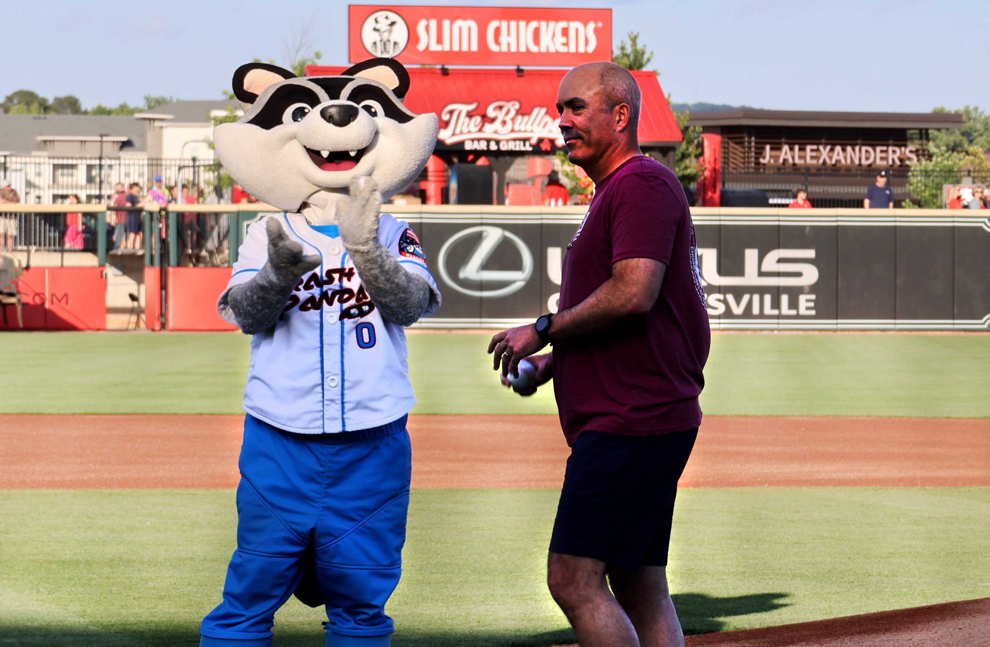 Huntsville Center’s commander throws first pitch at Trash Panda Armed ...