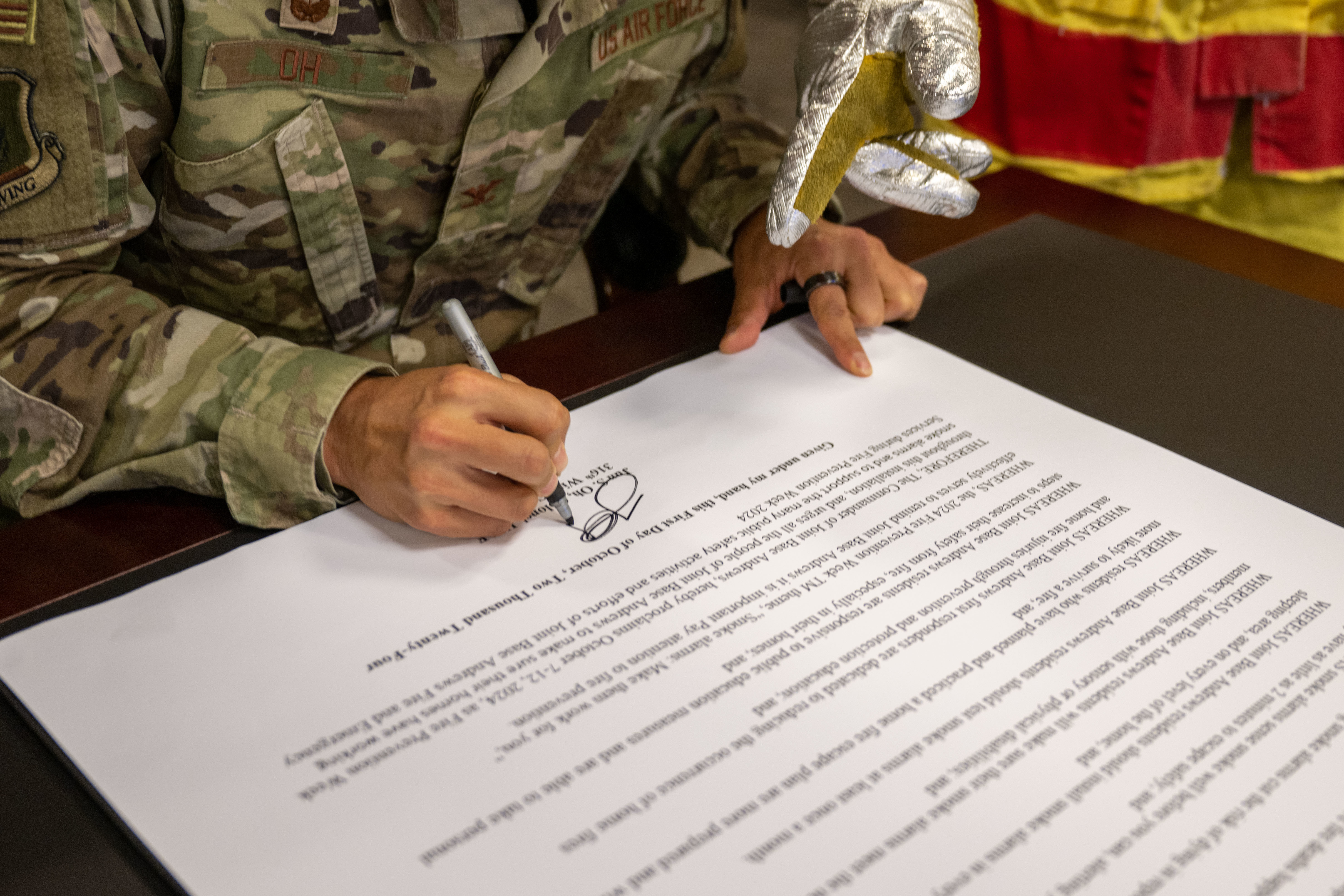 316th Wing commander signs 2024 Fire Prevention Week proclamation ...