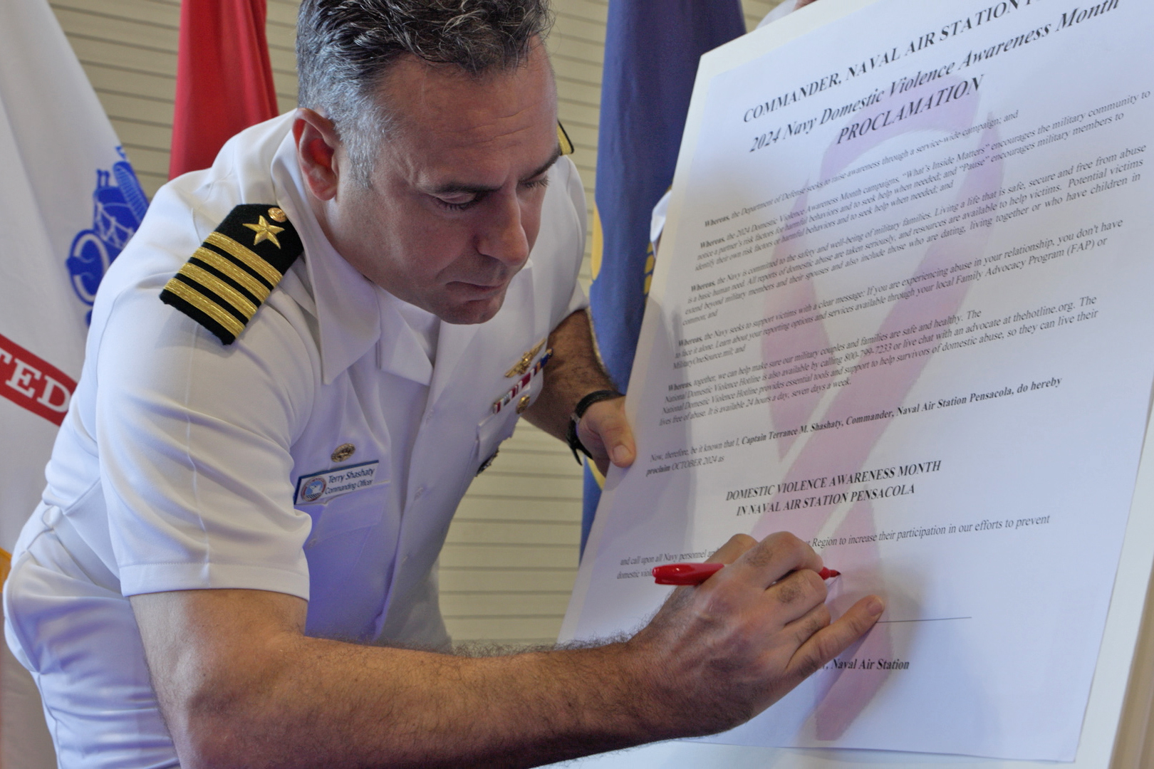 NAS Pensacola CO Signs Proclamation for Domestic Violence Awareness ...