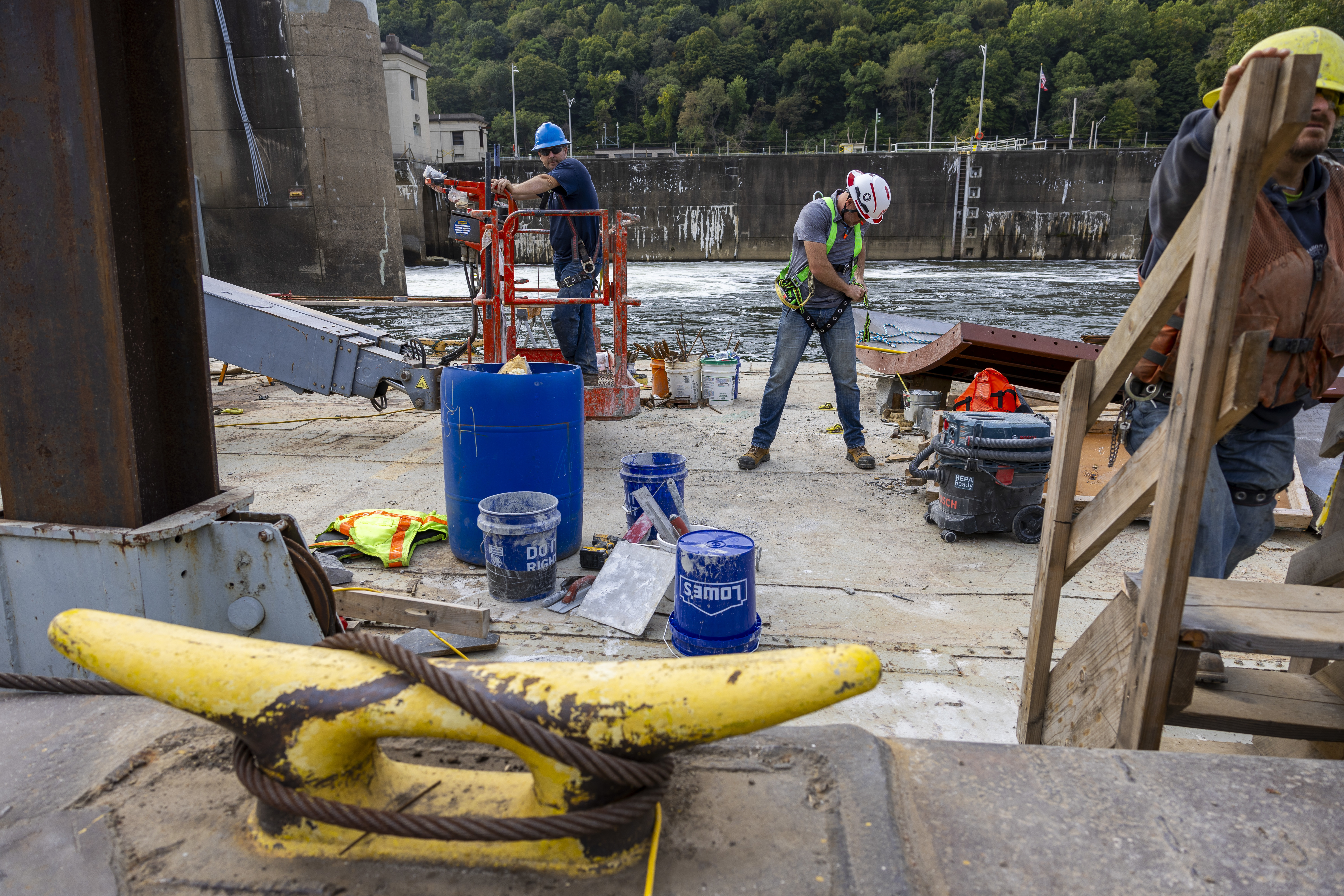 Chipping away old concrete to preserve Montgomery Dam piers for the ...