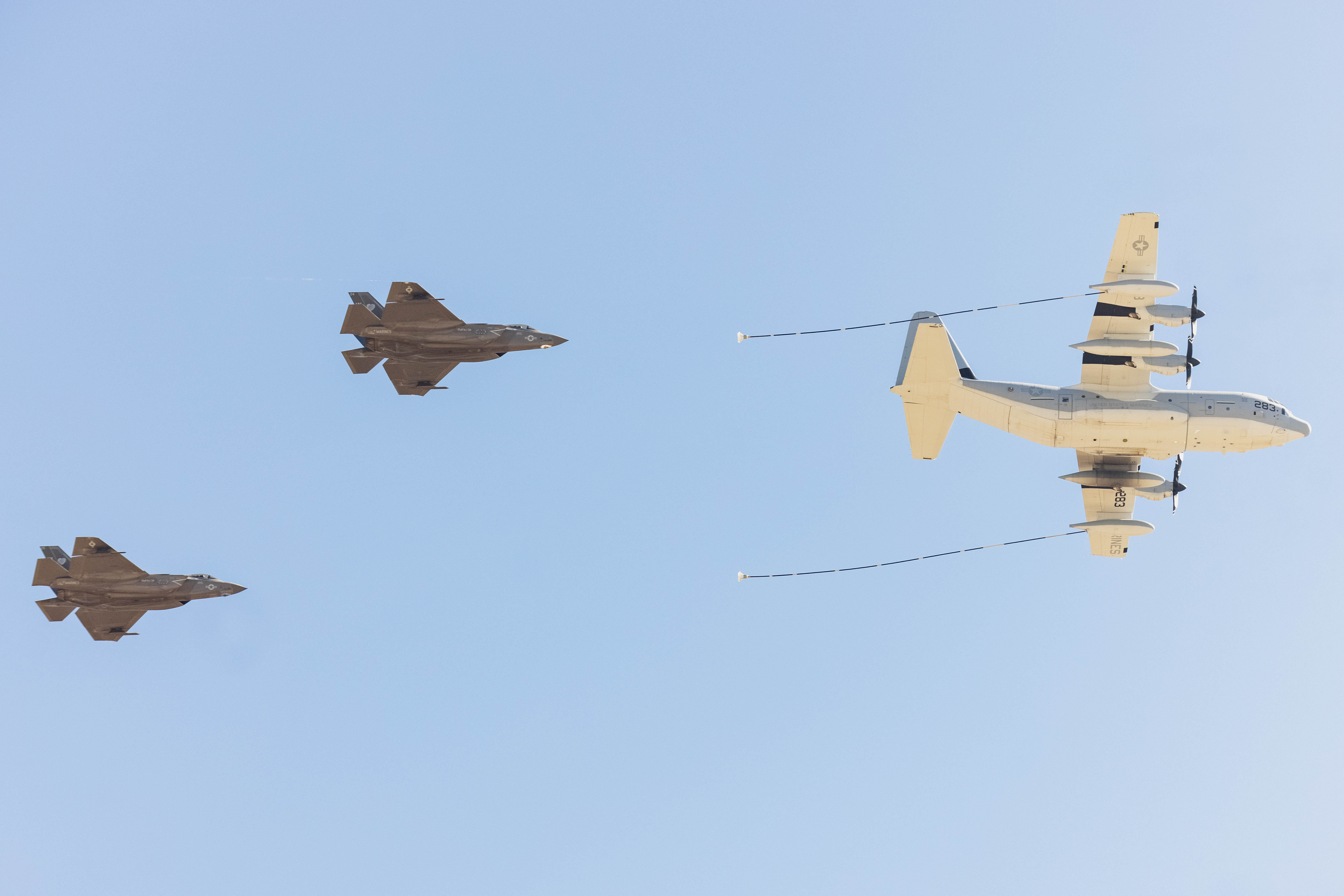 Two U.S. Marine Corps F-35C Lightning II and a KC-130J Hercules ...