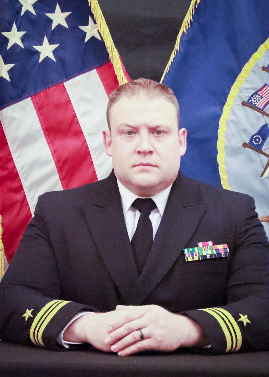 Lieutenant Commander John W. McCauley > Naval Education and Training ...