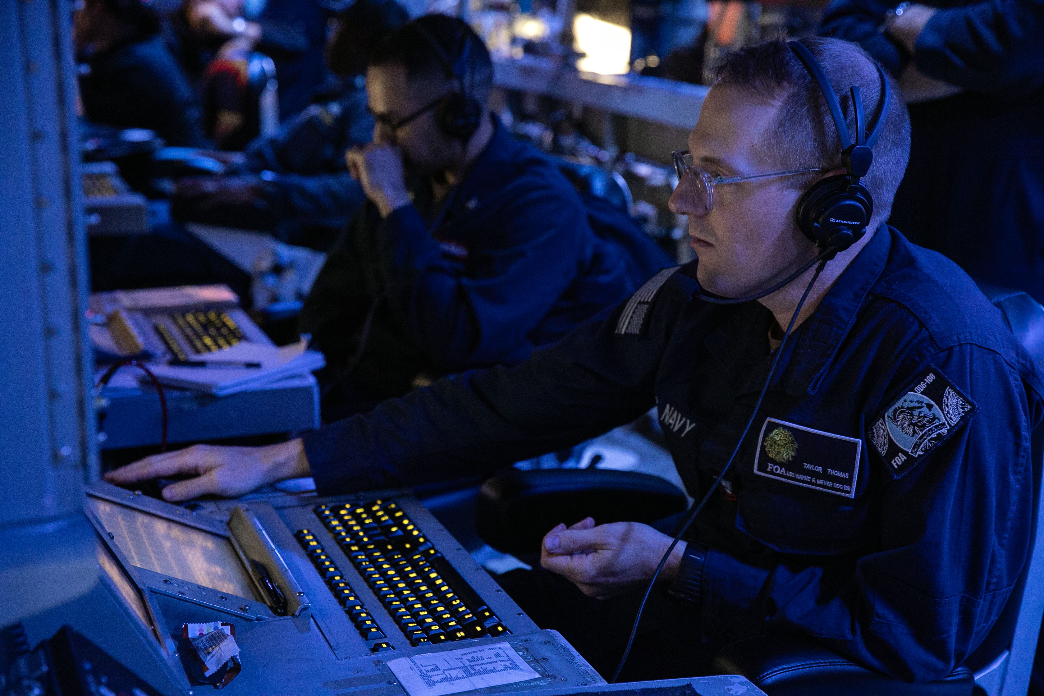USS Wayne E. Meyer Sailors Work in CIC while in Indian Ocean