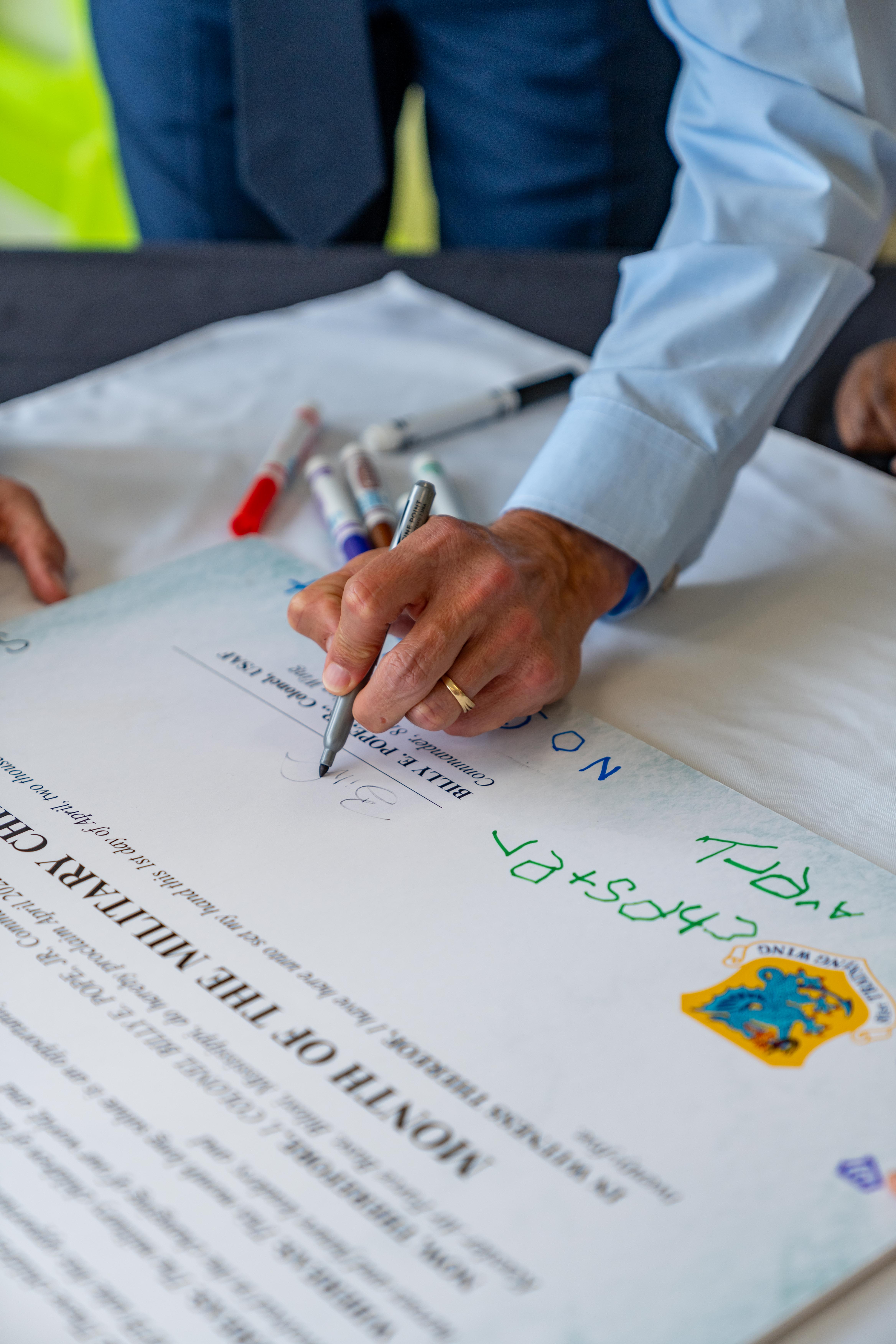 Col Pope signs Month of the Military Child proclamation > Keesler Air ...