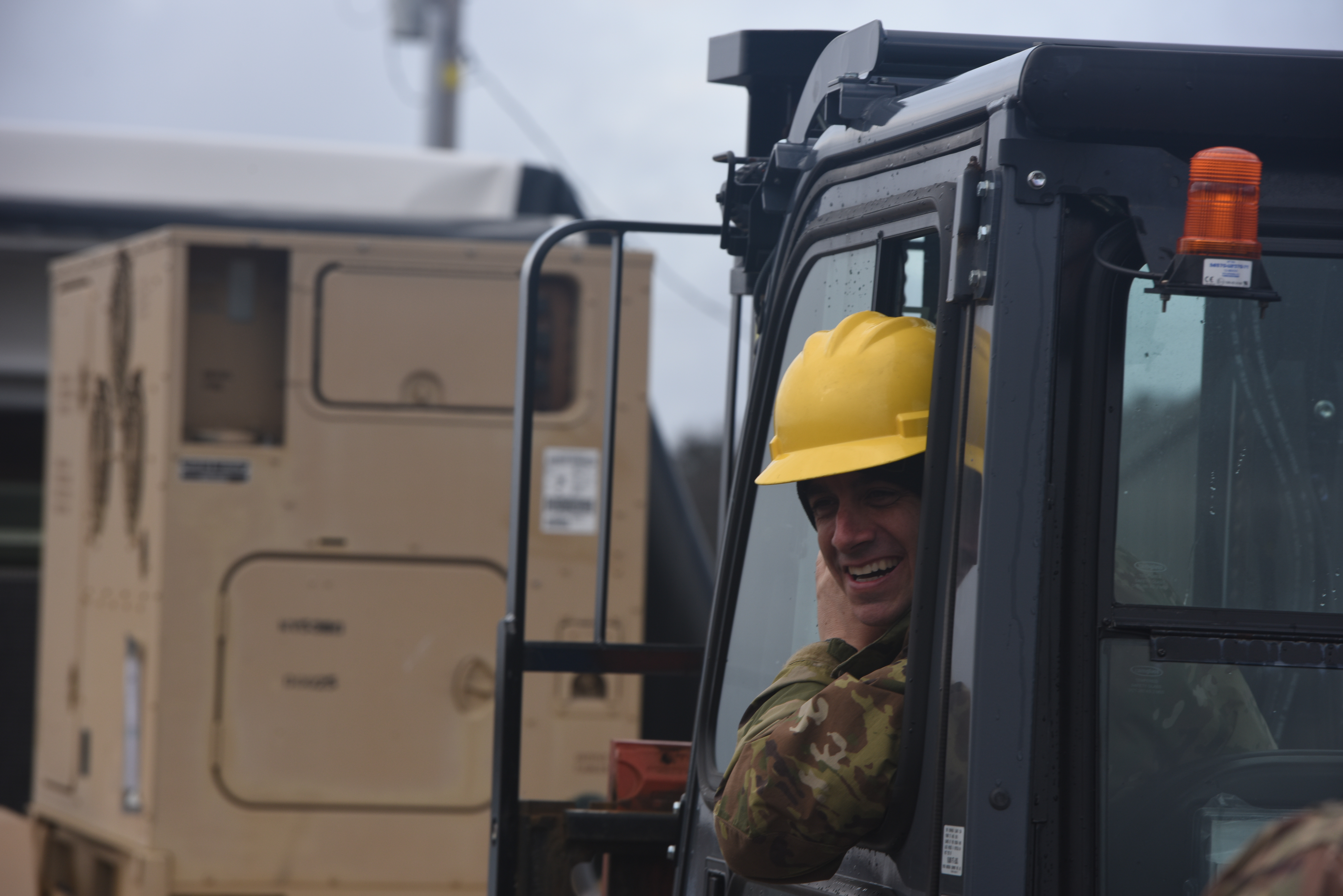 Loading equipment on trucks