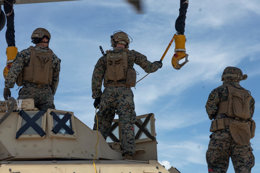 U.S. Marines with 2nd DSB execute external lifts with a JLTV