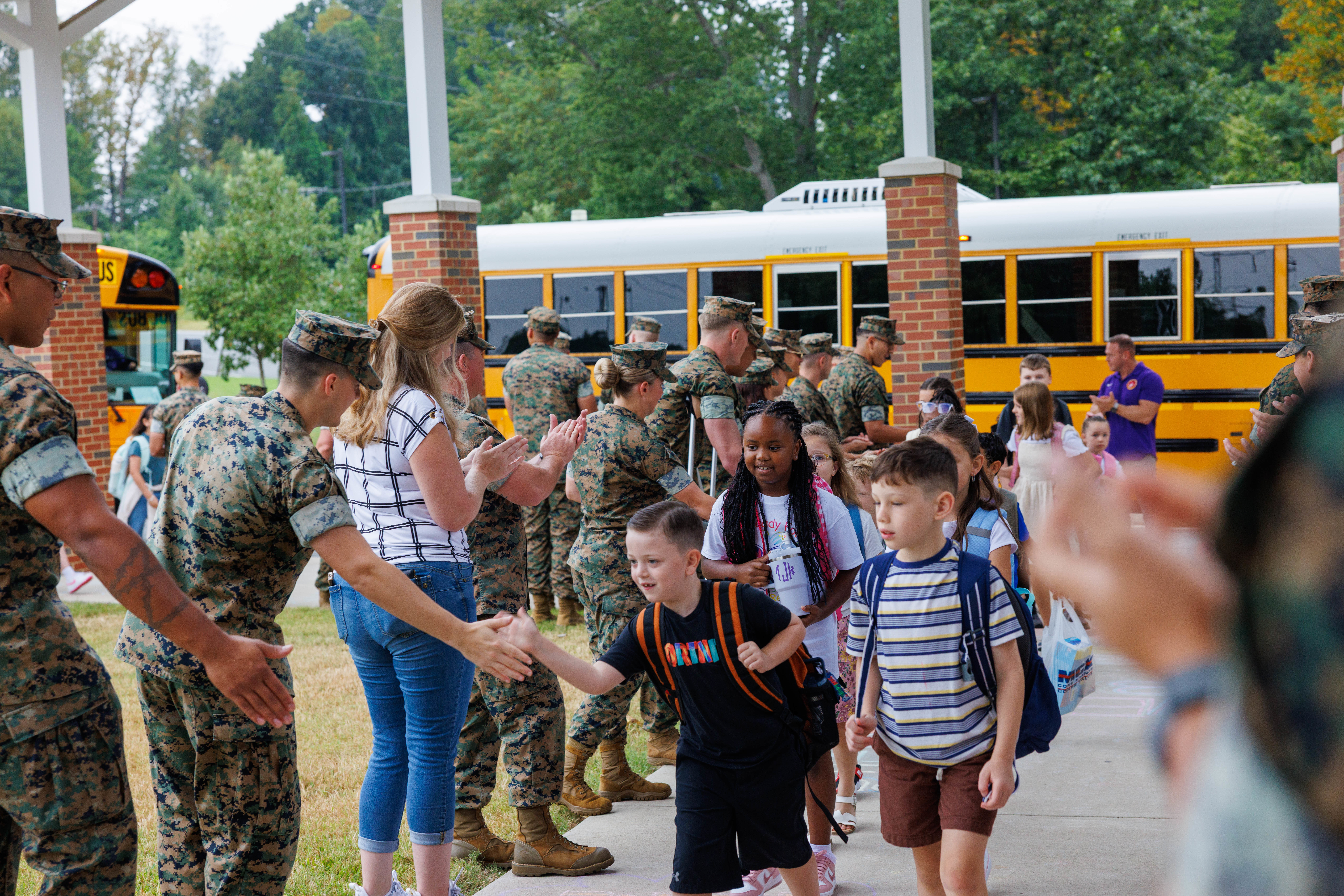 U.S. Marines welcome students back to school
