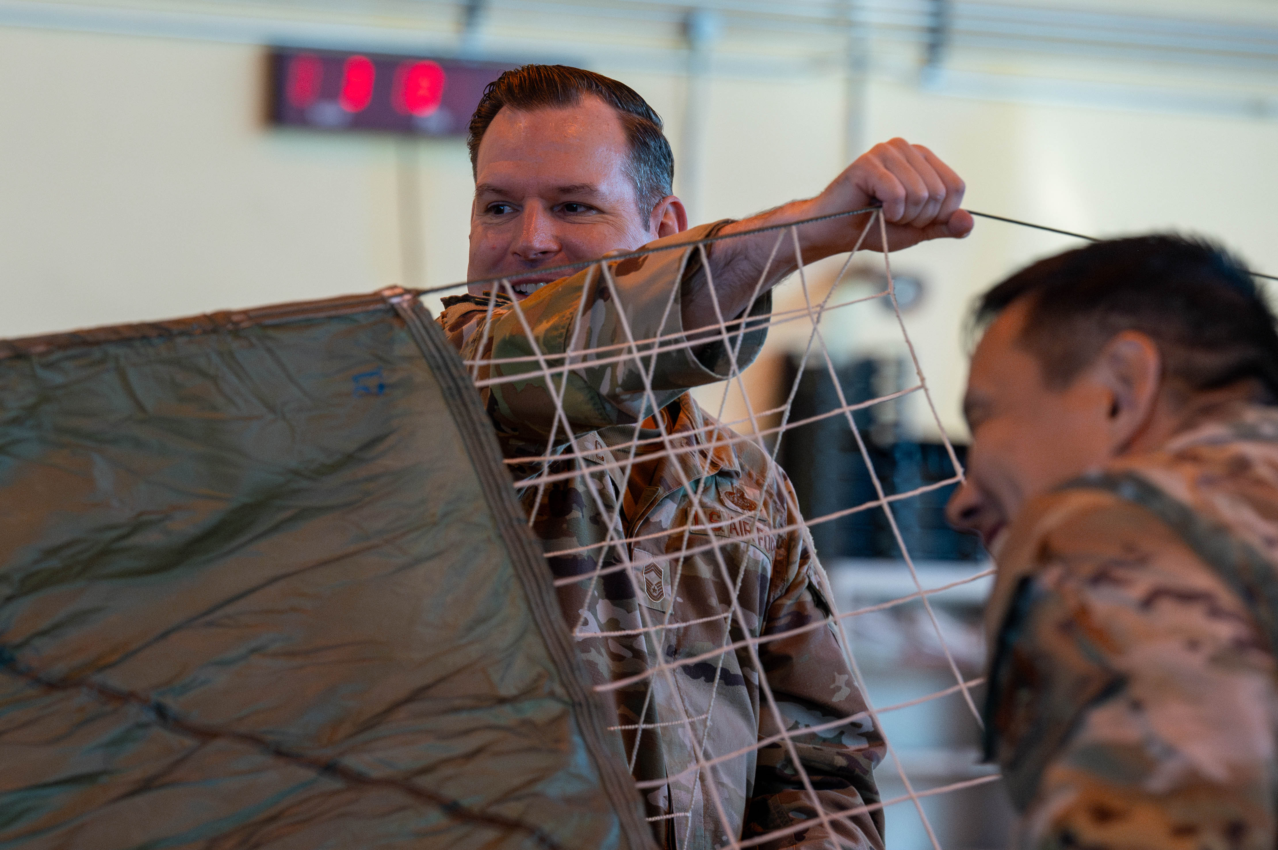 CMF holds parachute rigging demo in preparation for OCD25 > 505th ...