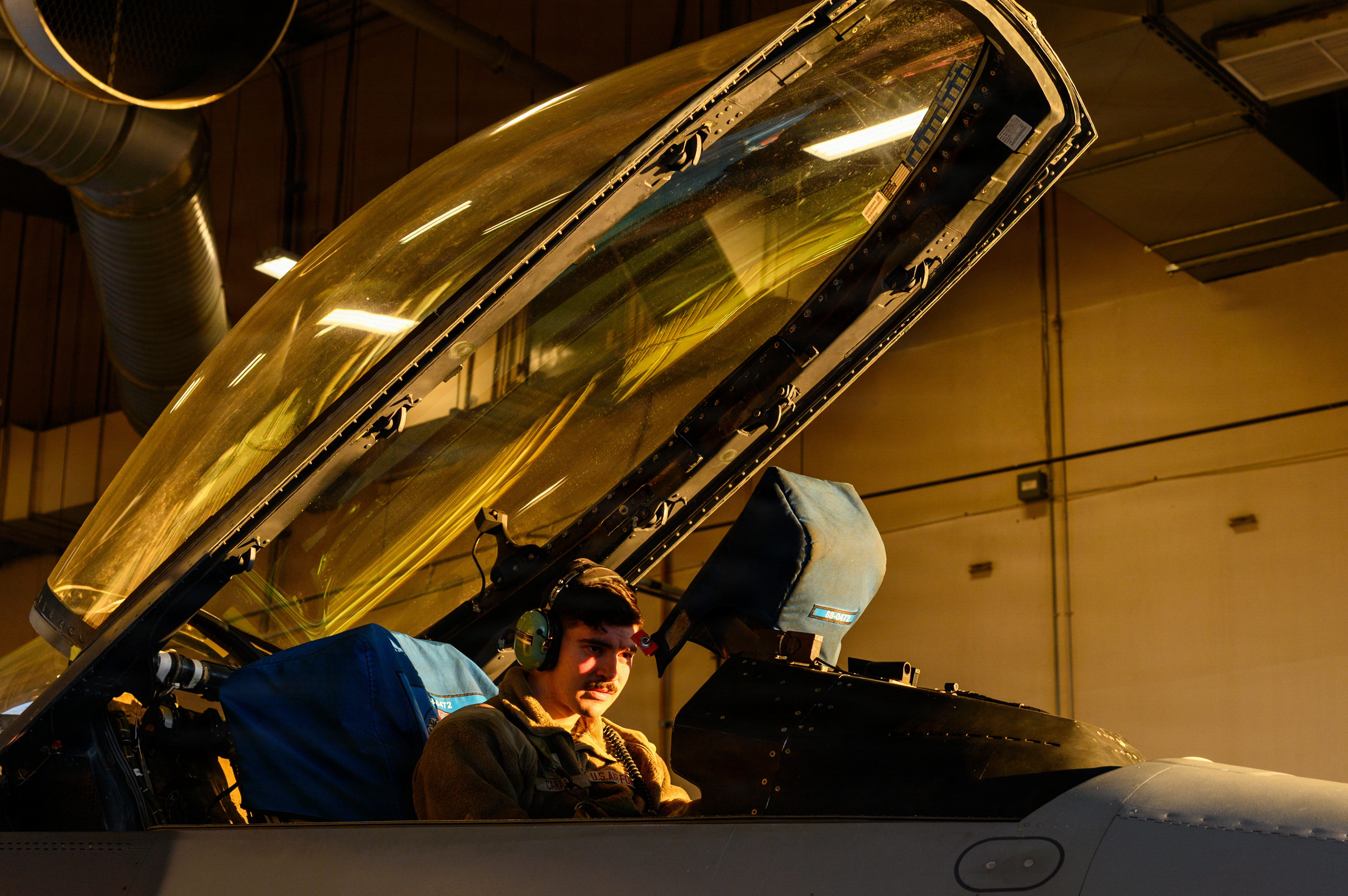 311th Aircraft Maintenance Unit works on F-16 Fighting Falcons day and ...