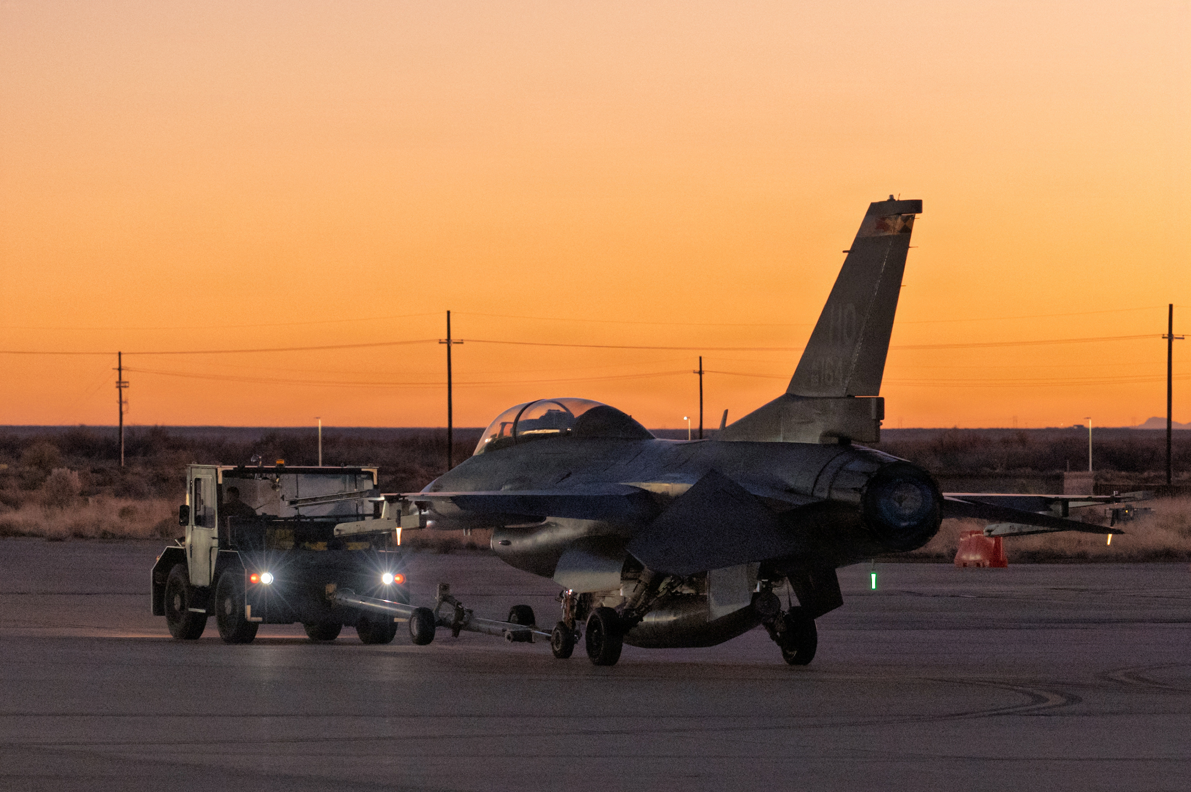 311th Aircraft Maintenance Unit works on F-16 Fighting Falcons day and ...