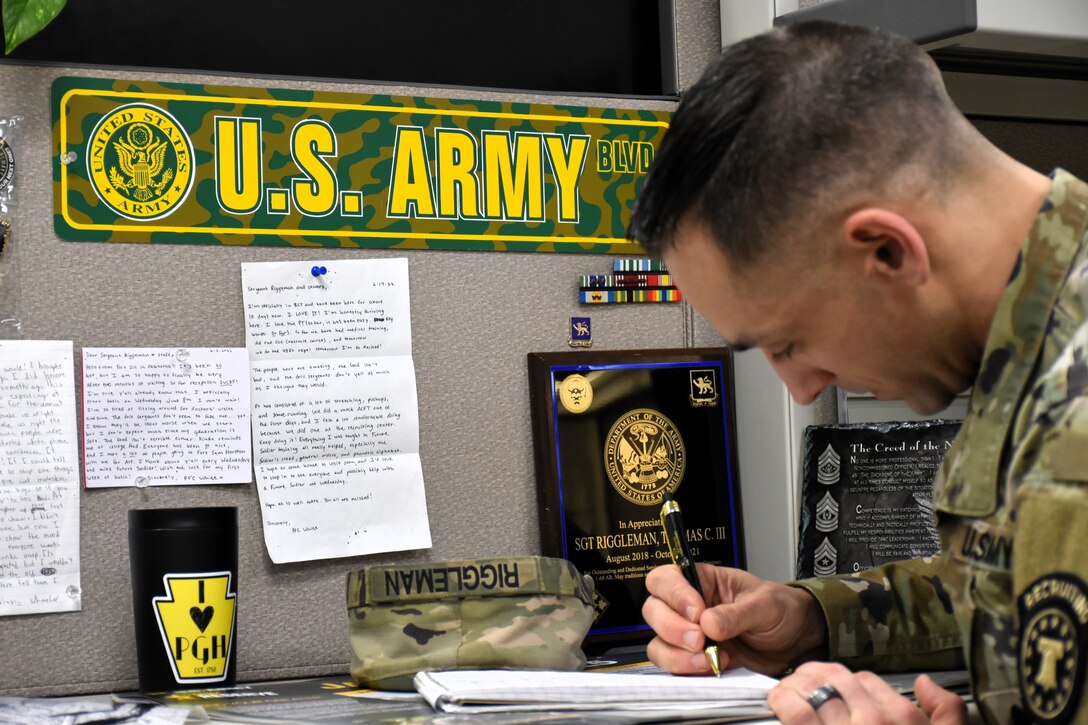 Staff Sgt. Riggleman at his desk at Harrisburg Recruiting Battalion