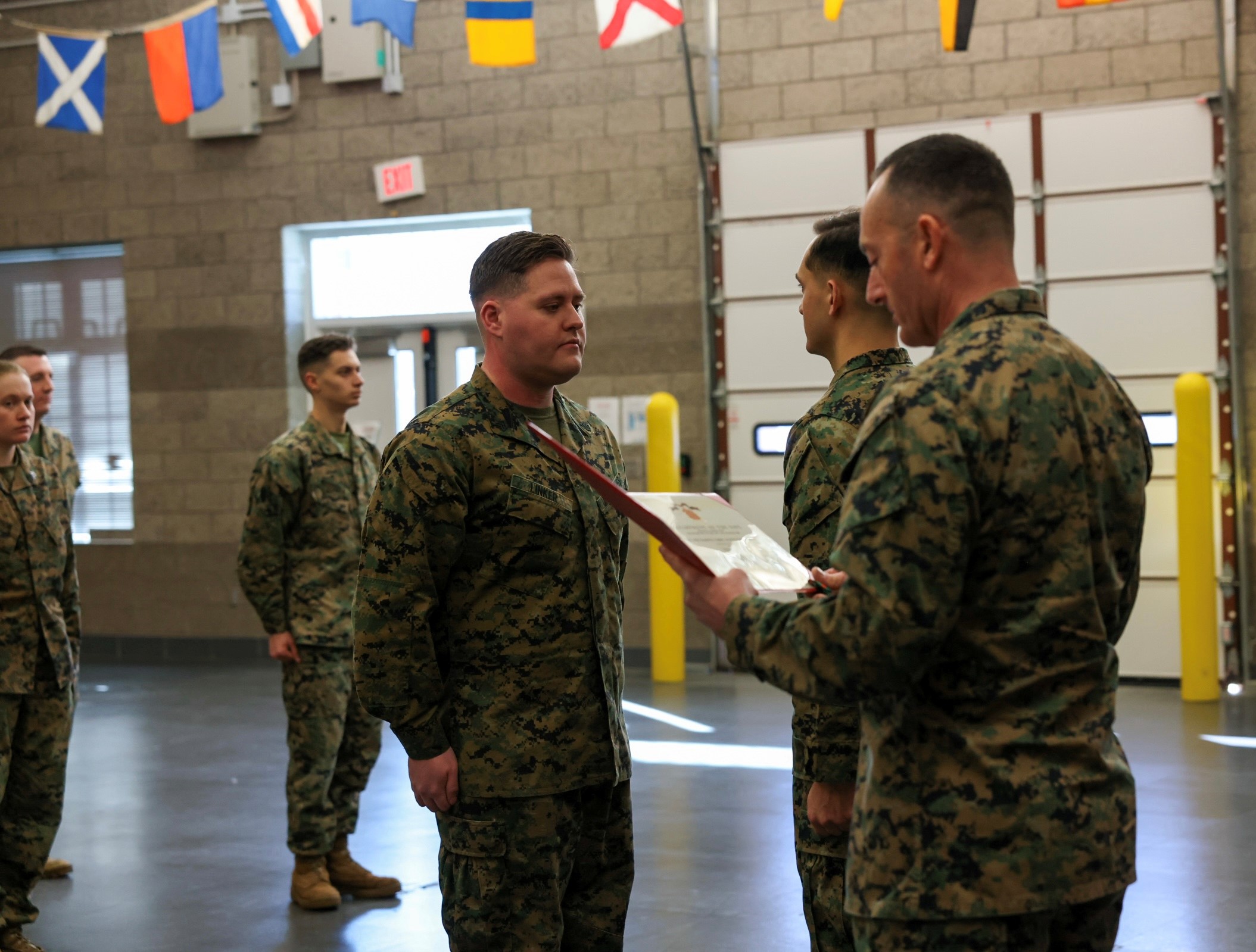 Paying It Forward: Marine Receives Navy and Marine Corps Achievement ...