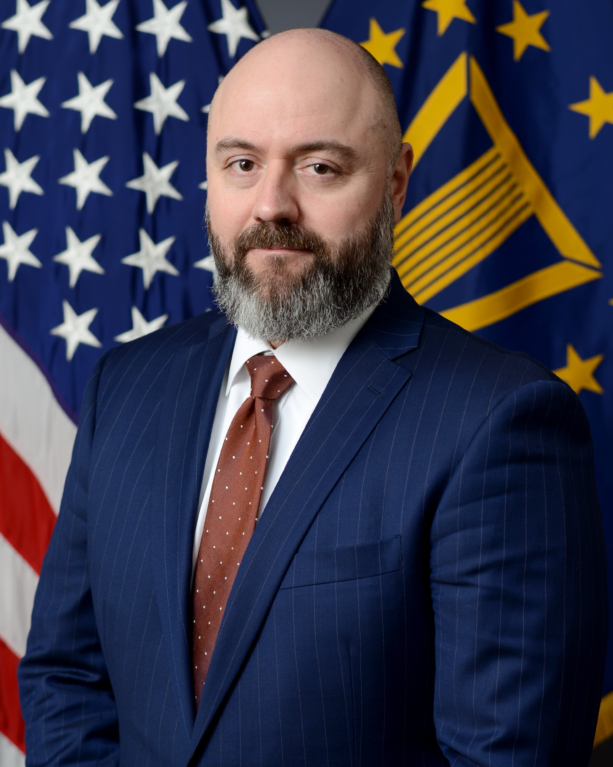 David A. Baker > U.S. Department of War > Biography