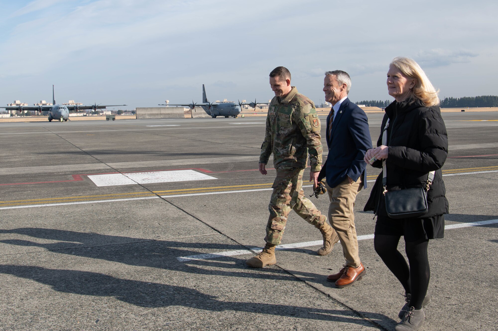DFAS personnel walk the flightline > Yokota Air Base > Article Display