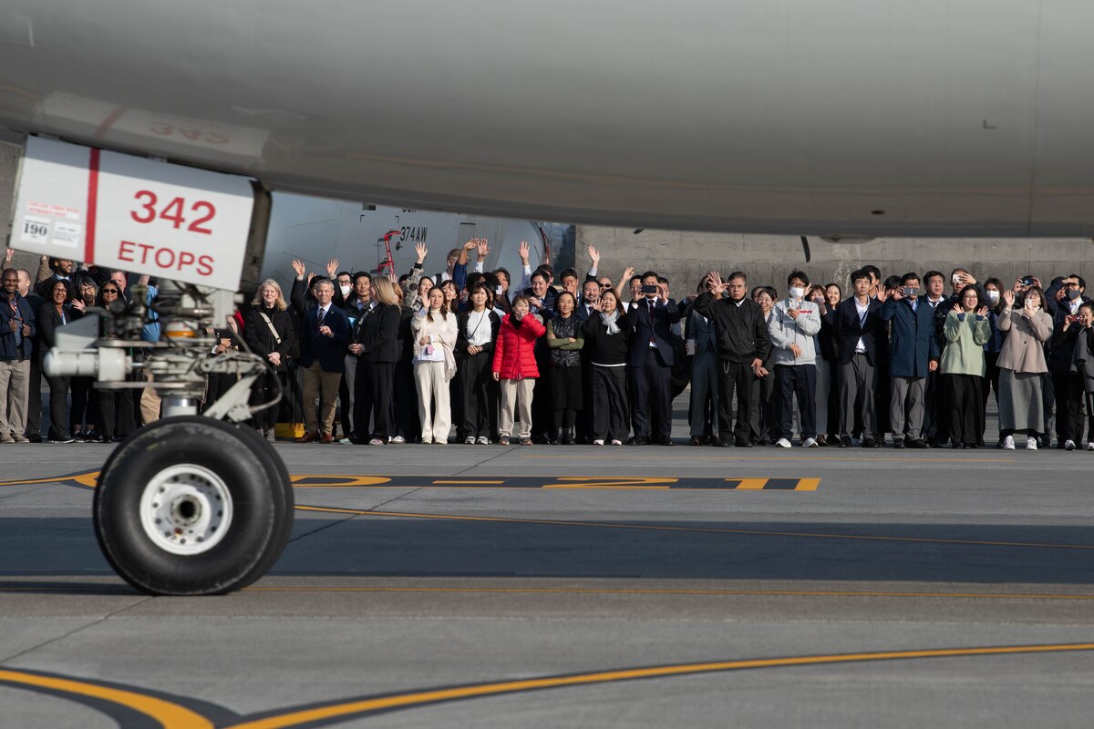 DFAS personnel walk the flightline > Yokota Air Base > Article Display
