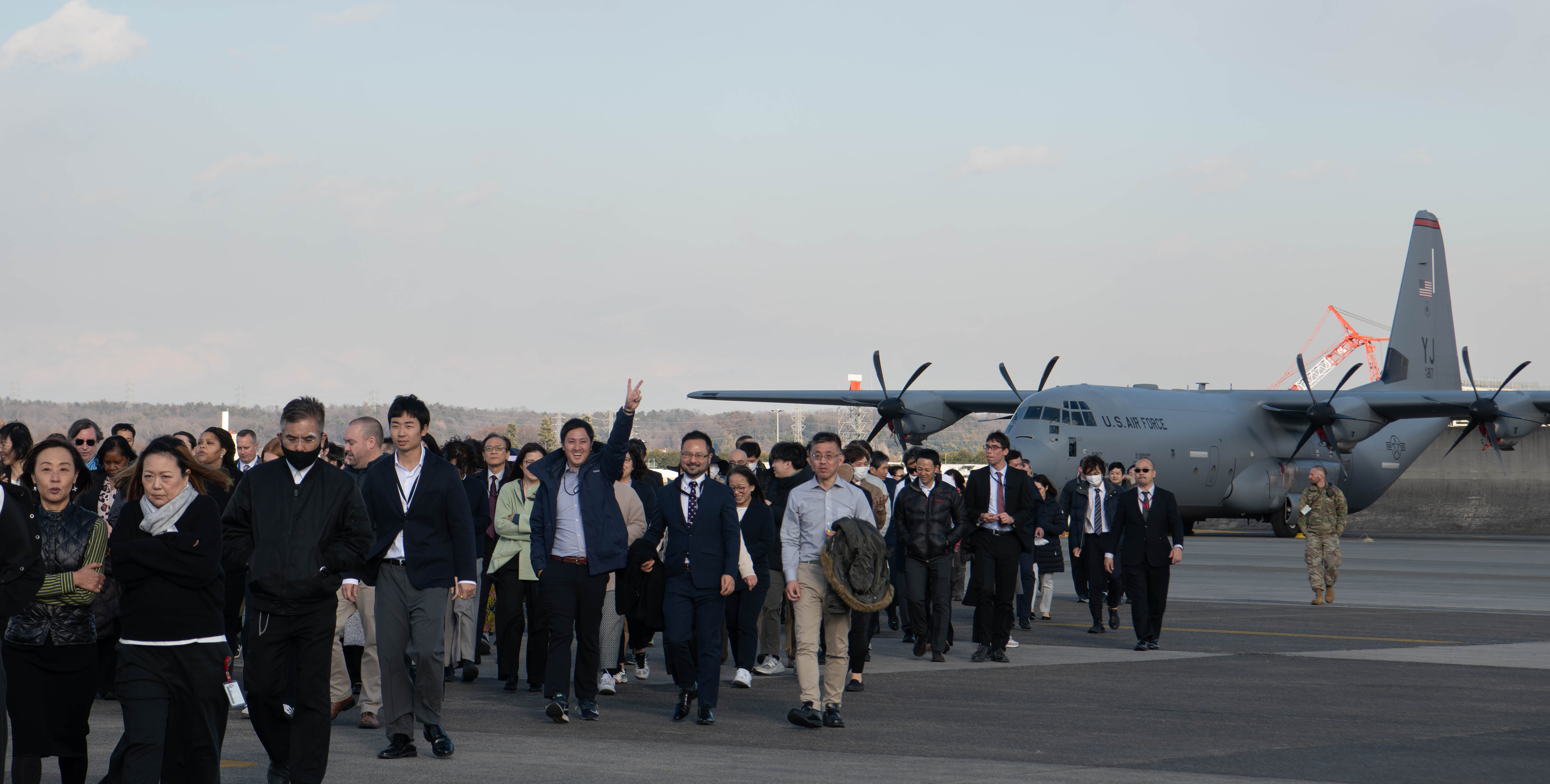 DFAS personnel walk the flightline > Yokota Air Base > Article Display