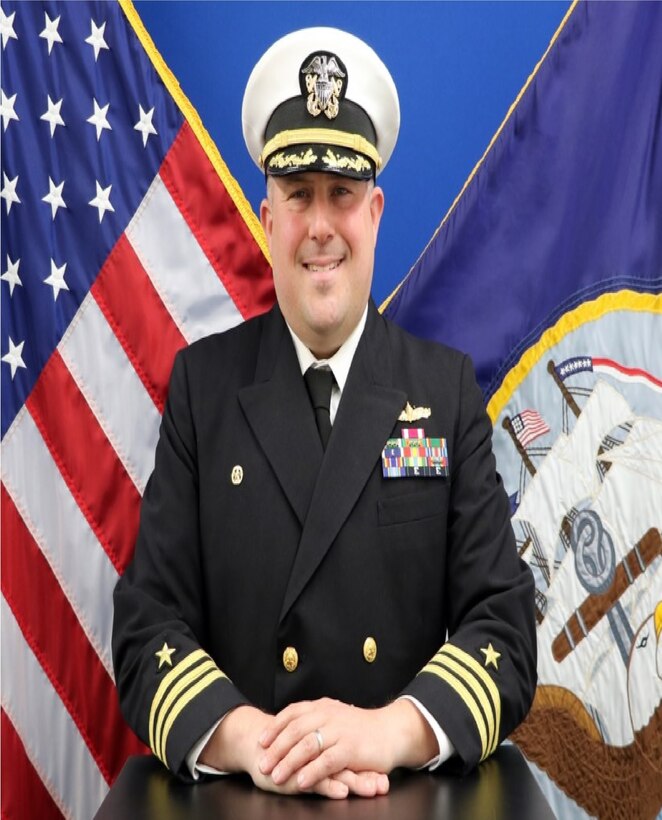 Commander Adam J. Ochs