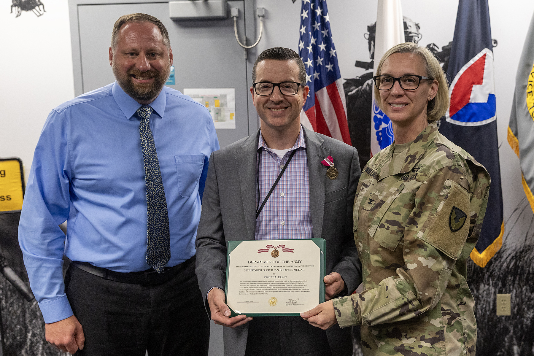 USAFMCOM awards Dunn's meritorious service