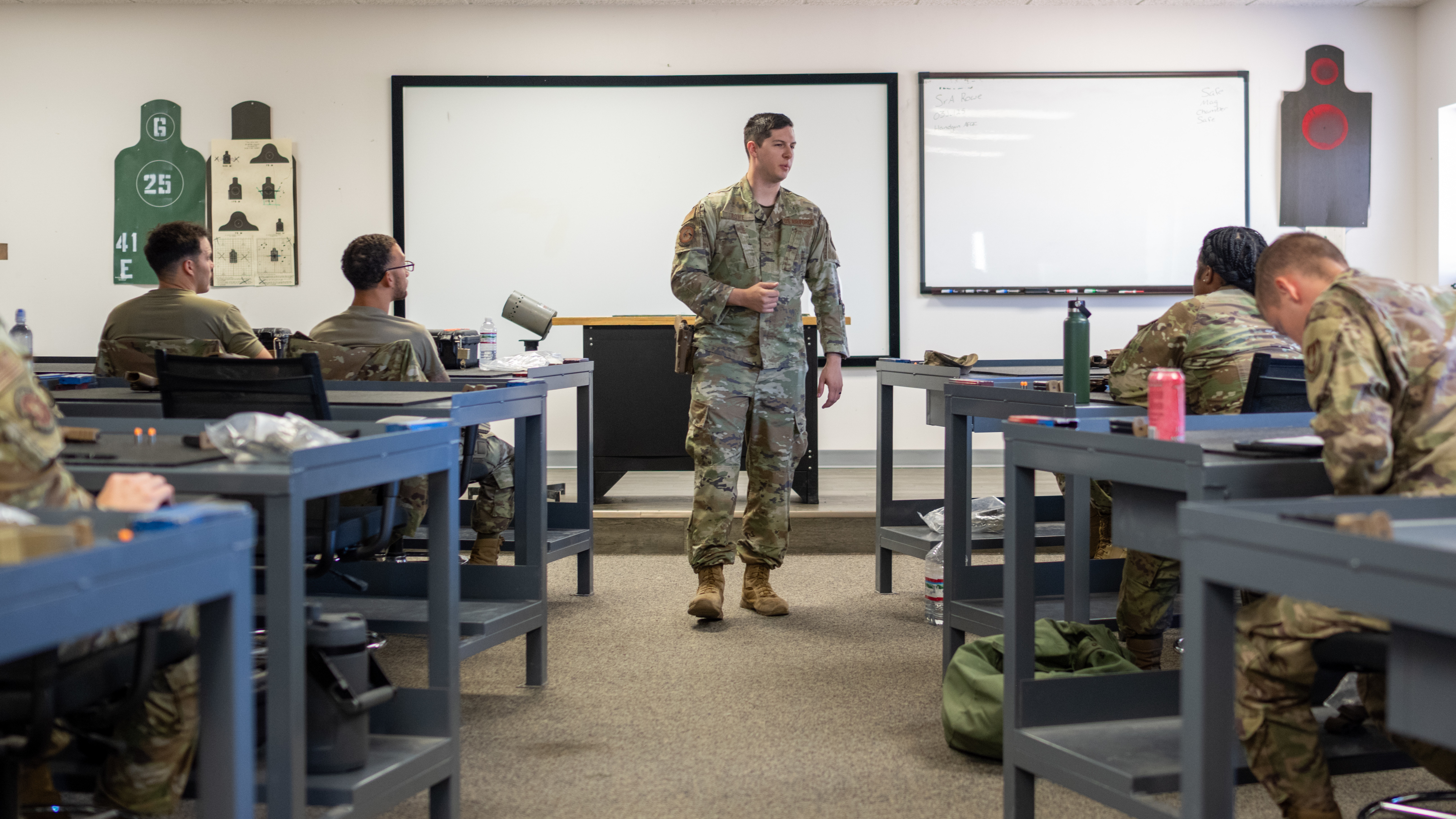 Holloman Combat Arms Training and Maintenance cadre make students and ...
