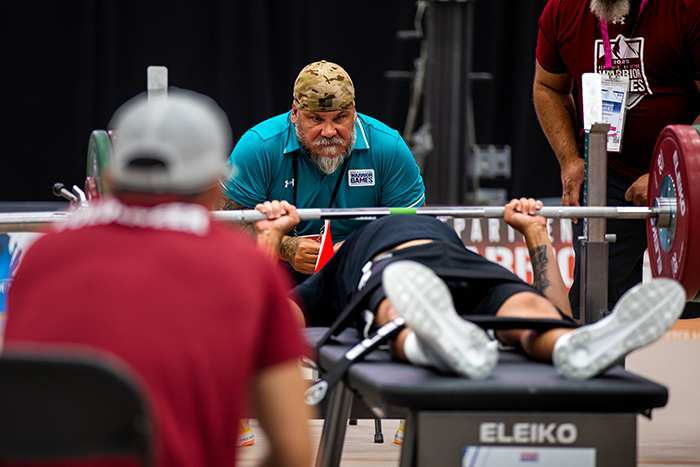 U.S. Army Staff Sgt. Nathaniel Mateo pushes hard to finish his first ...