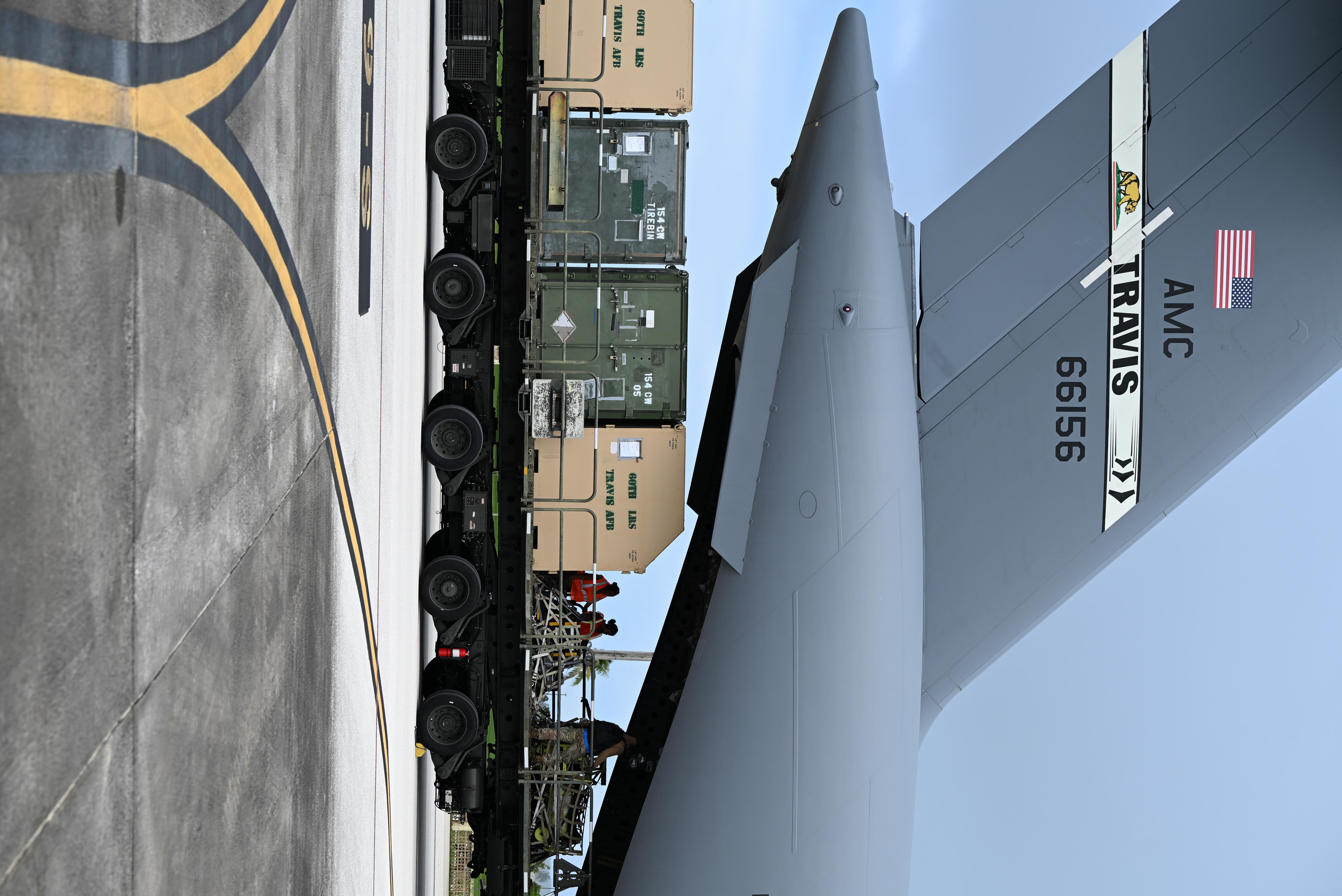 Training in Motion: 734th AMS conducts C-17 engine running offload ...