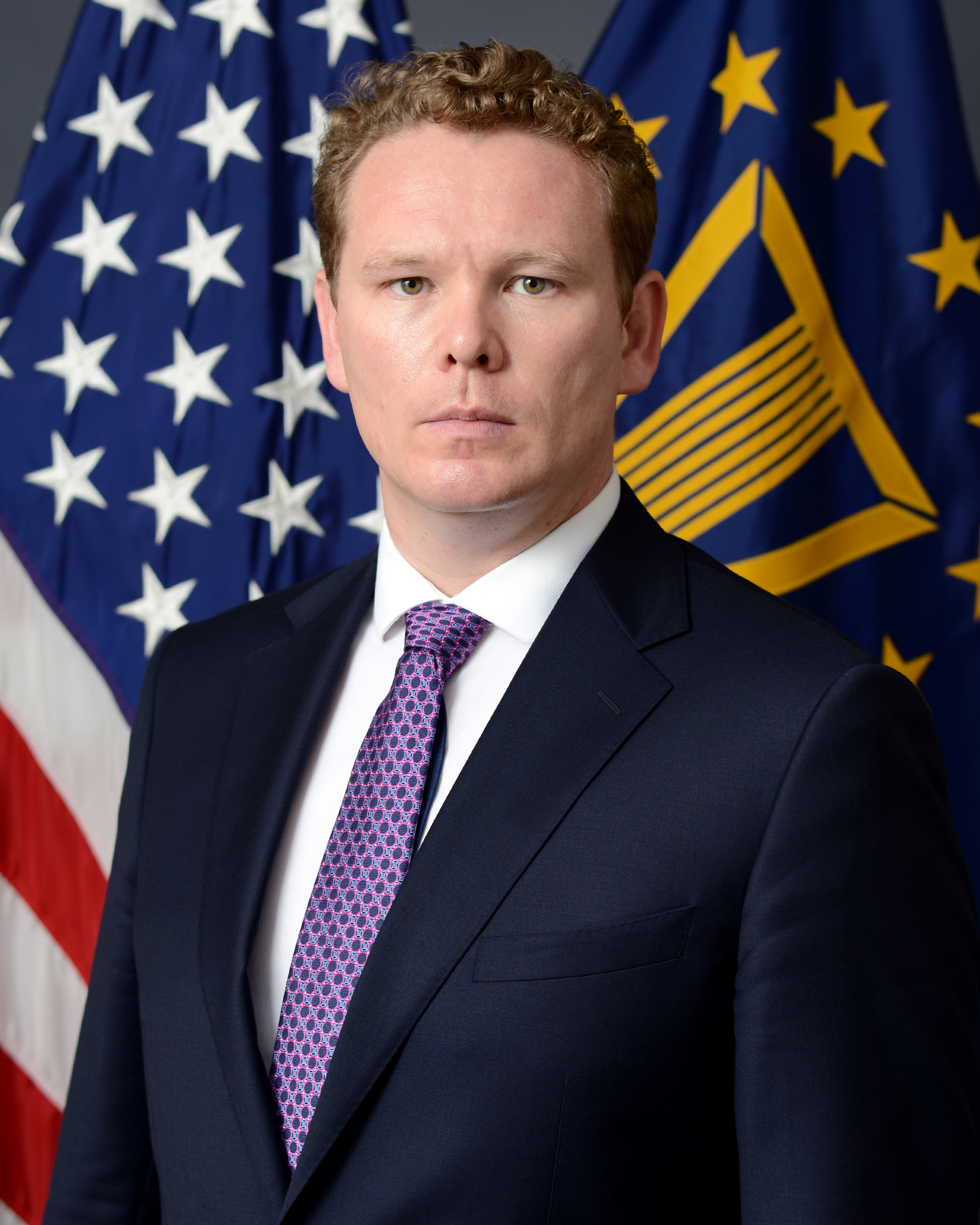 Christopher Mamaux > U.S. Department of War > Biography