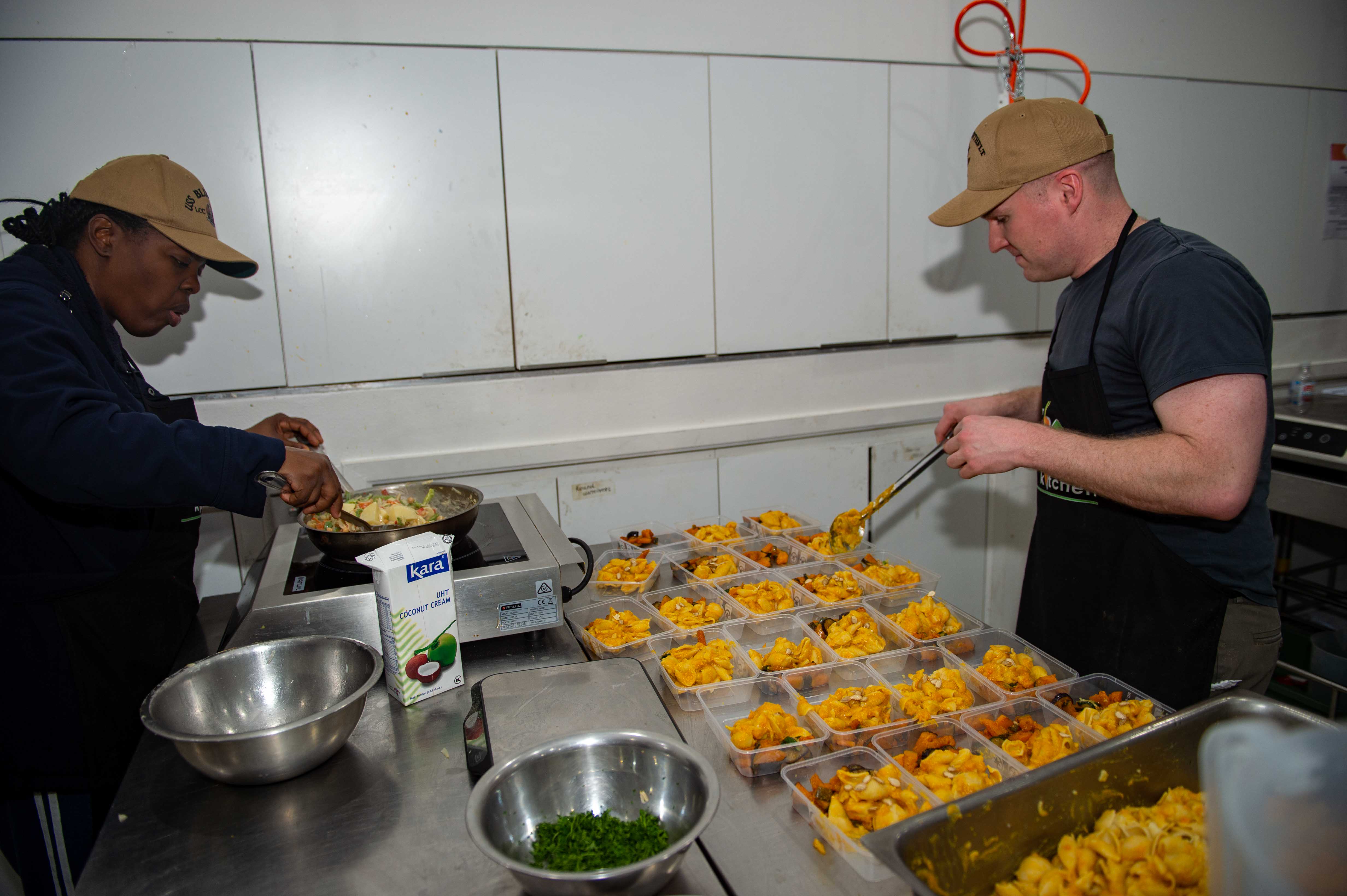 U.S. Navy Sailors Cook Meals for People in Need in Australia ...