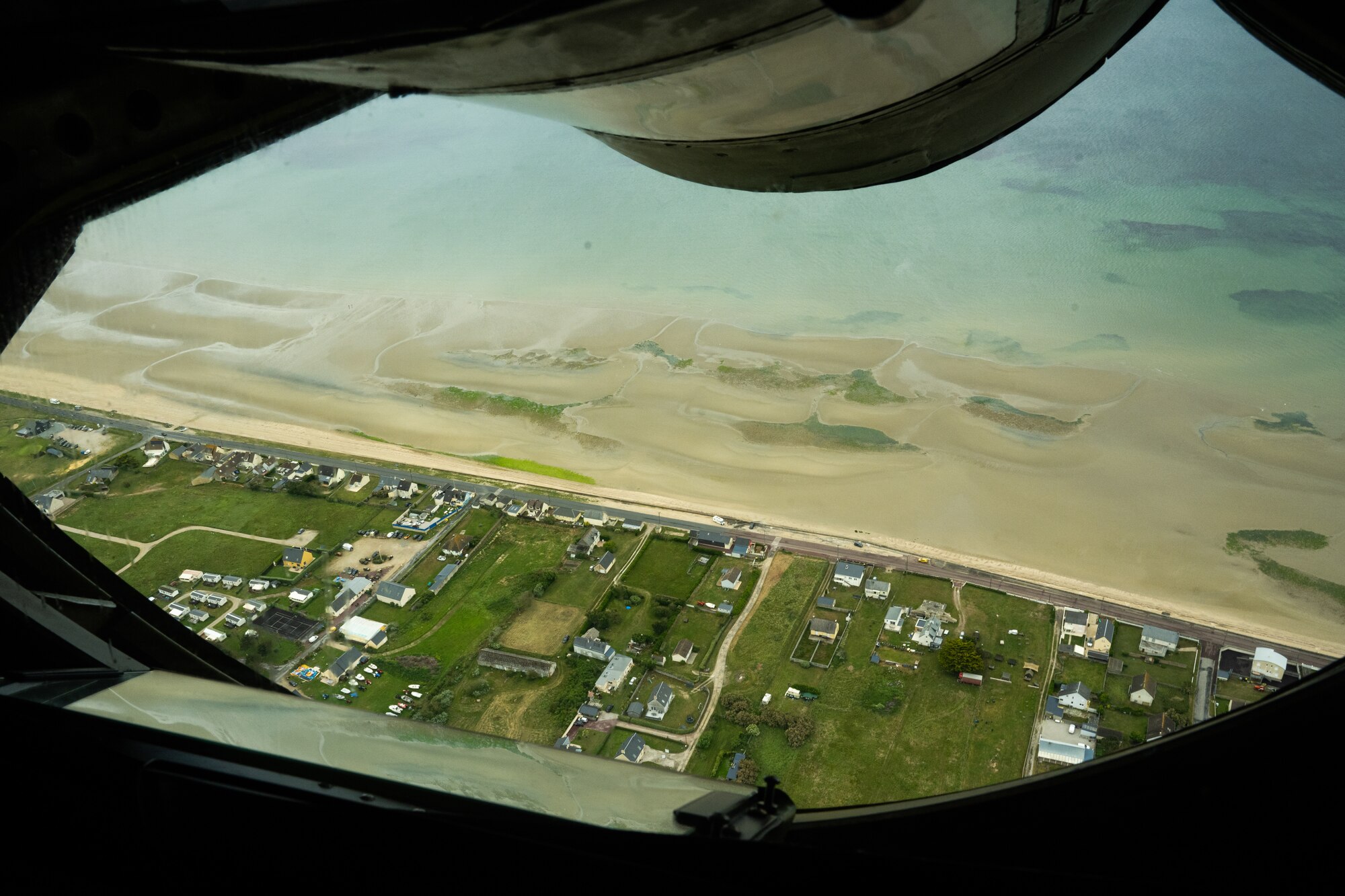 The 100th ARW flies over the Beaches of Normandy for the 81st ...