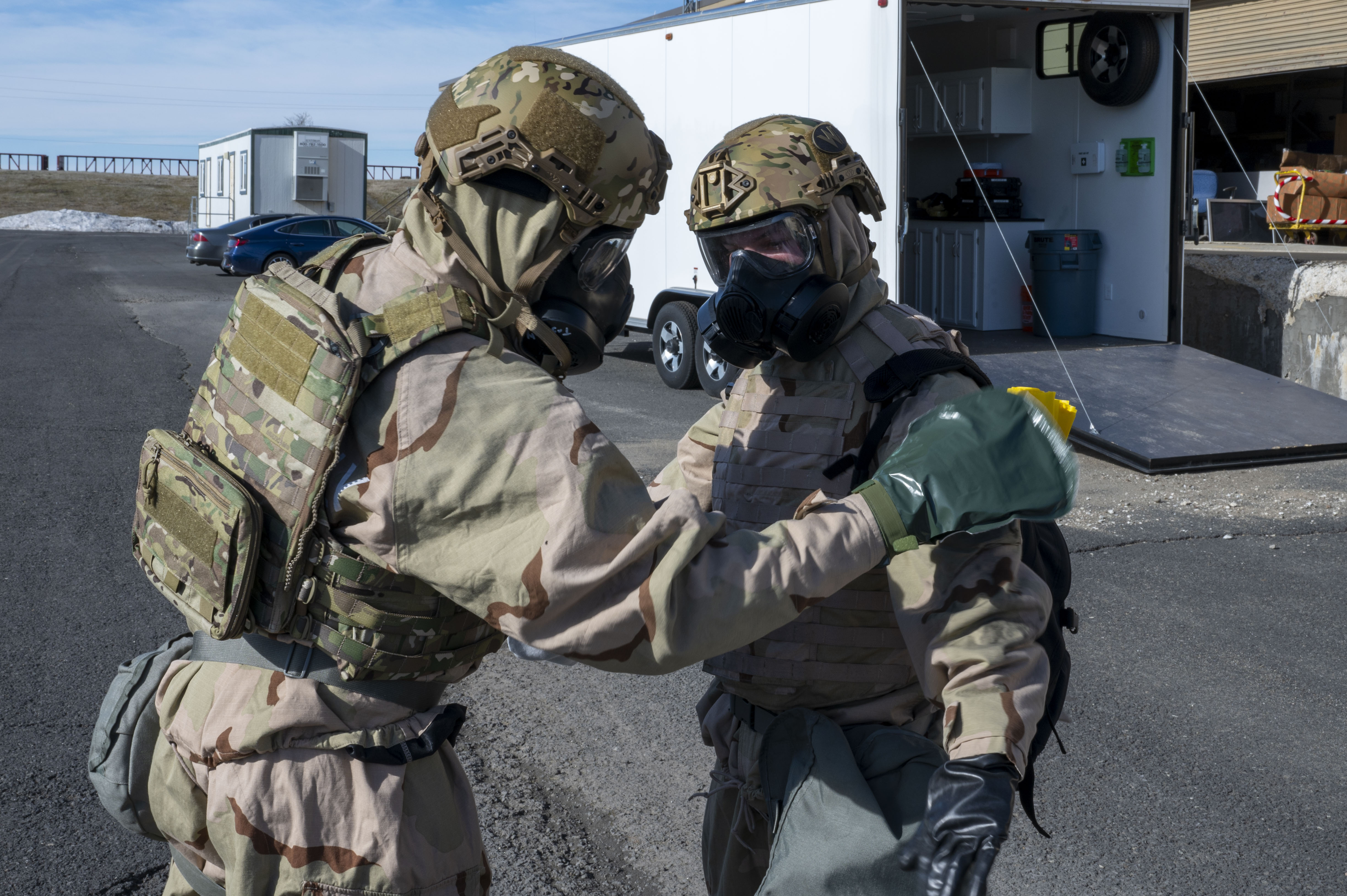 Photos: Emergency management specialists conduct contamination control ...