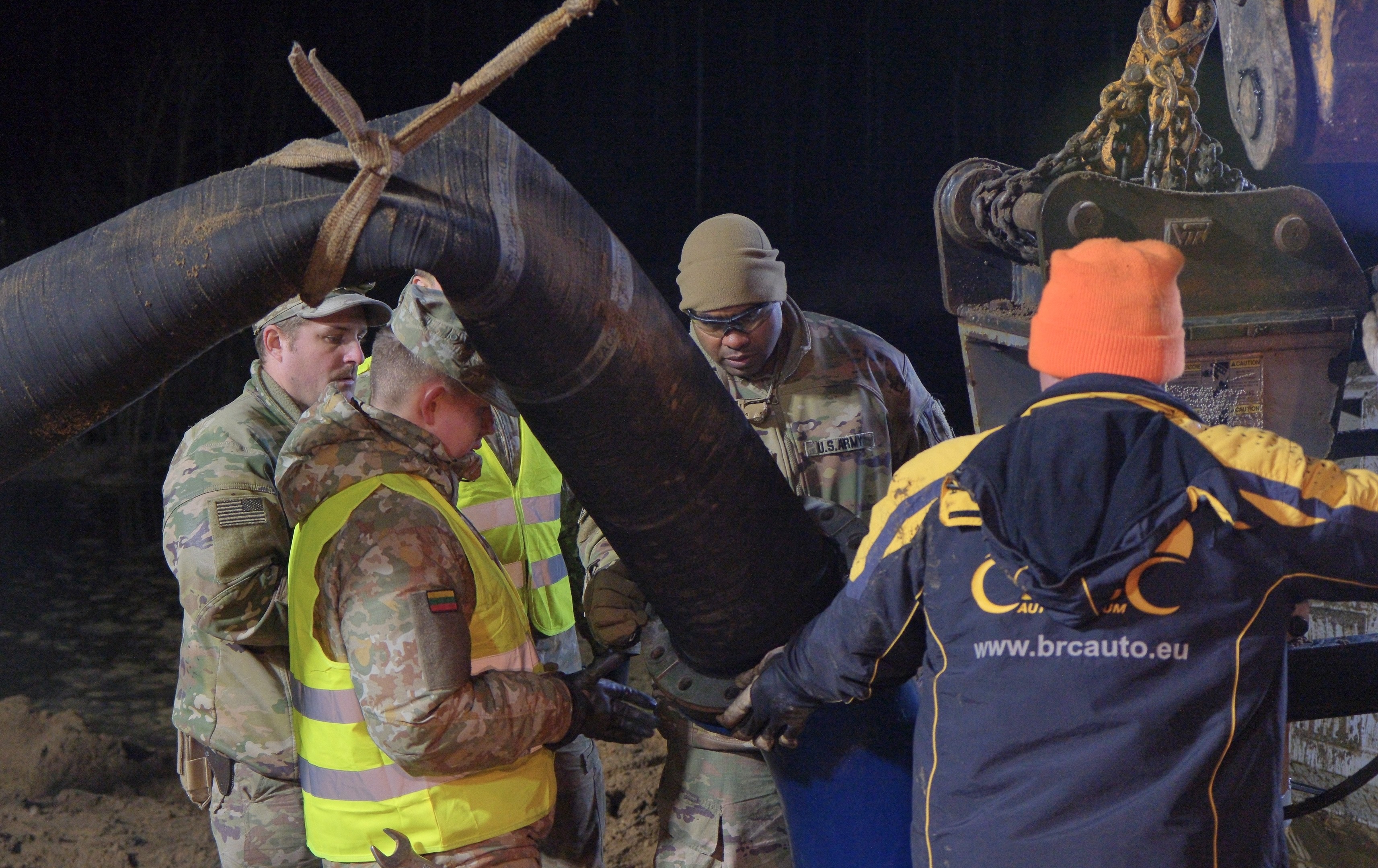 Recovery Efforts Continue at Site of Submerged Vehicle in Search for Missing Soldiers